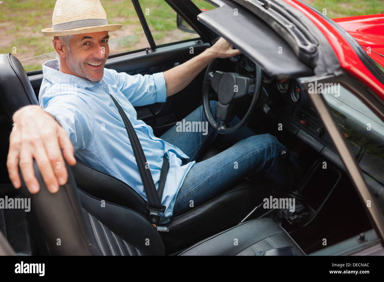 Man in red car hi-res stock photography and images - Alamy