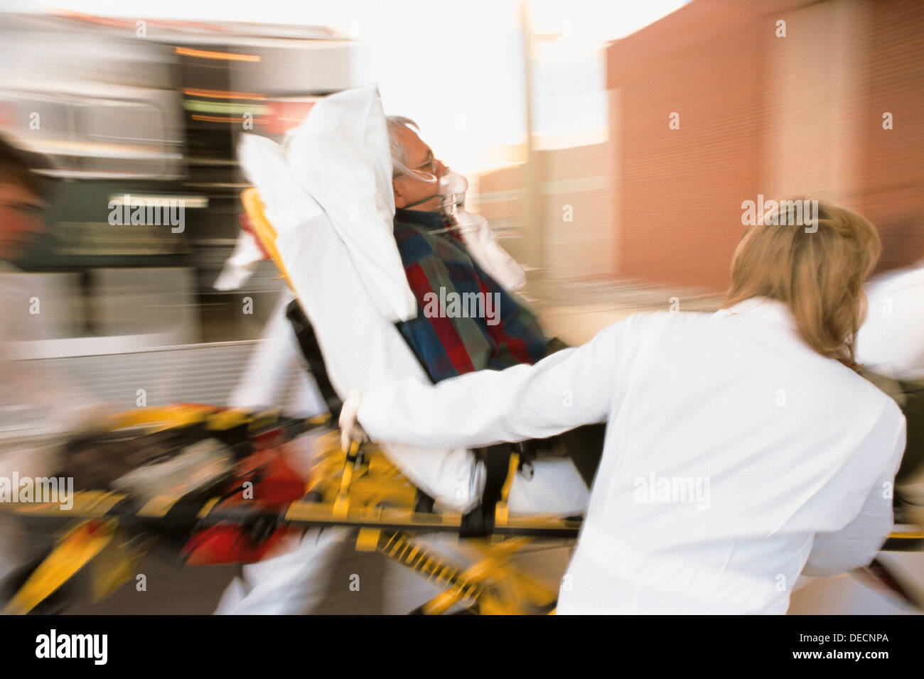 Doctor Rushing Elderly Patient Hospital High Resolution Stock ...