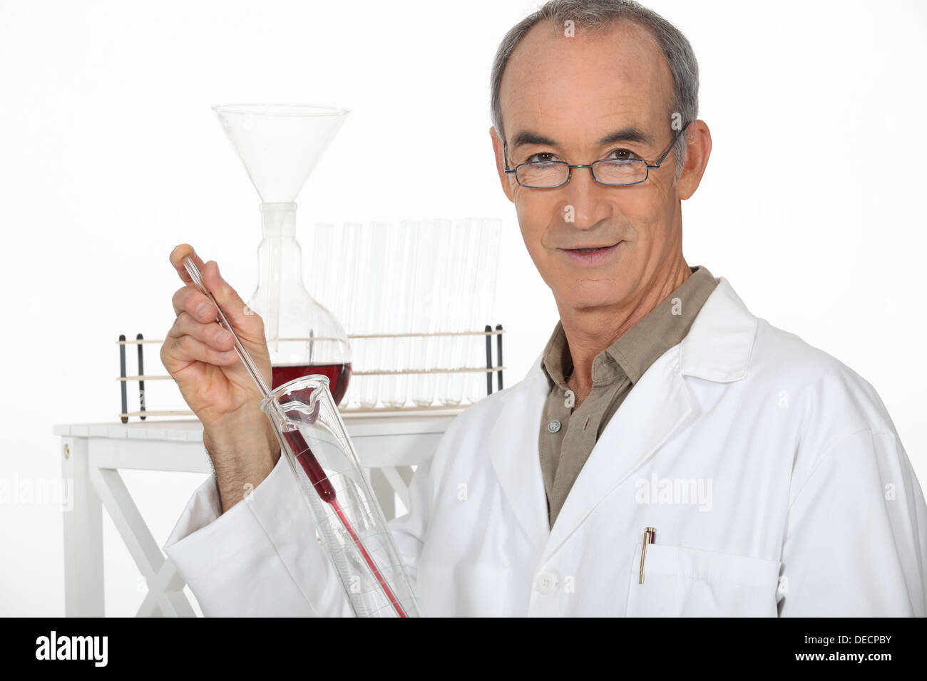 Scientist performing an experiment Stock Photo - Alamy