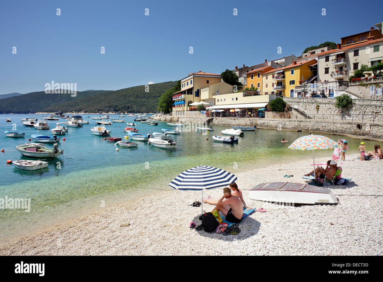 Rabac, Croatia, bathers on the beach in Rabac Stock Photo - Alamy