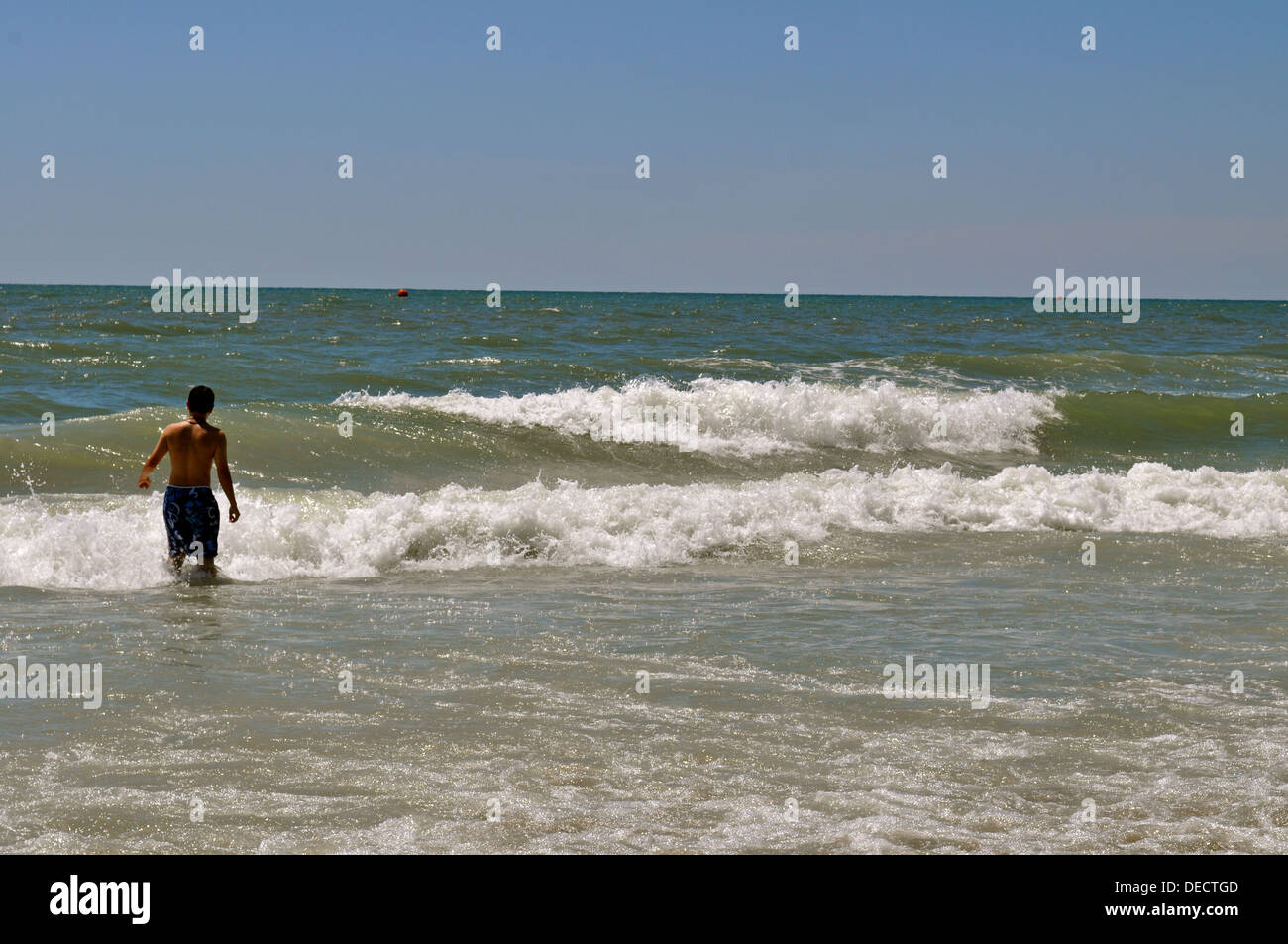 Boy on the beach Stock Photo - Alamy
