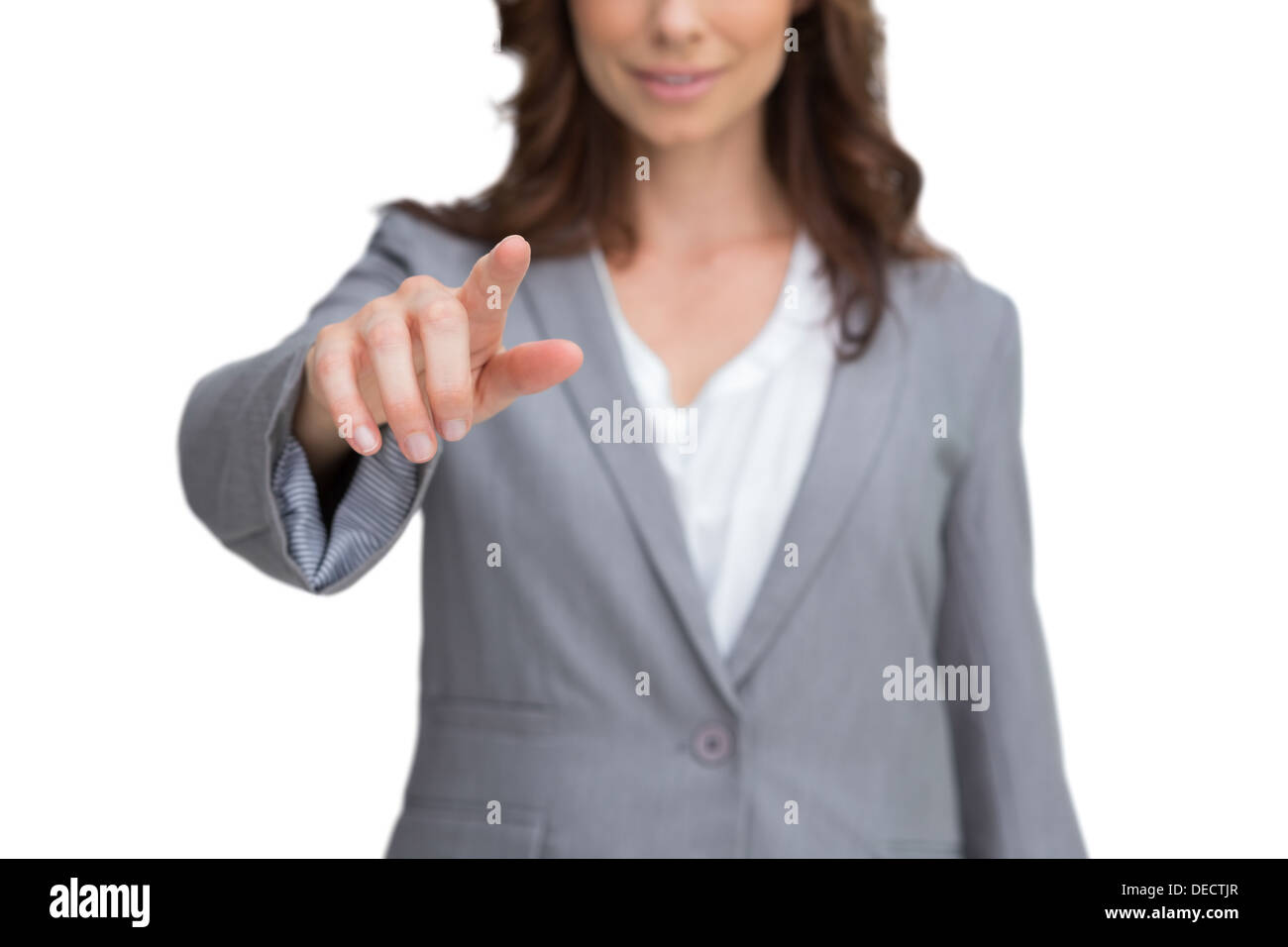 Smiling businesswoman pointing at screen Stock Photo - Alamy
