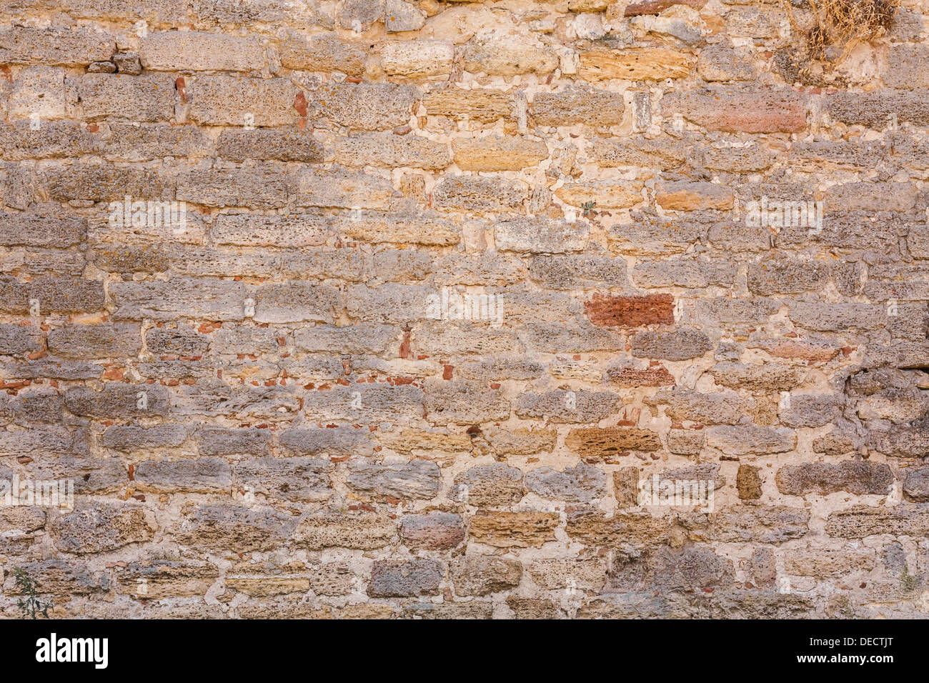 Old wall made of the Jerusalem stone. Wall constructed of stone bricks ...