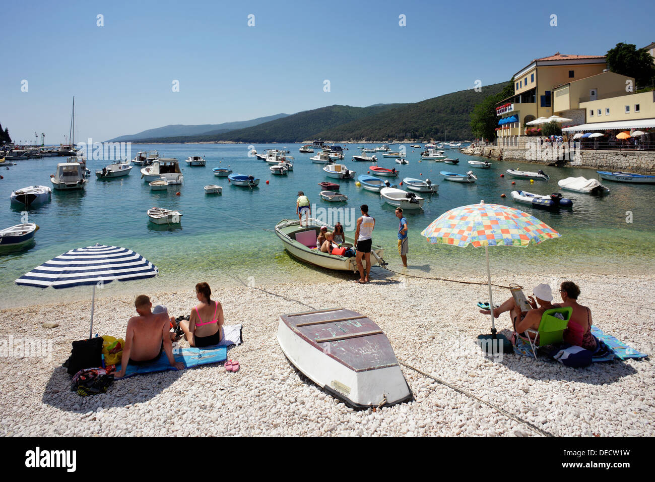 Rabac, Croatia, bathers on the beach in Rabac Stock Photo - Alamy