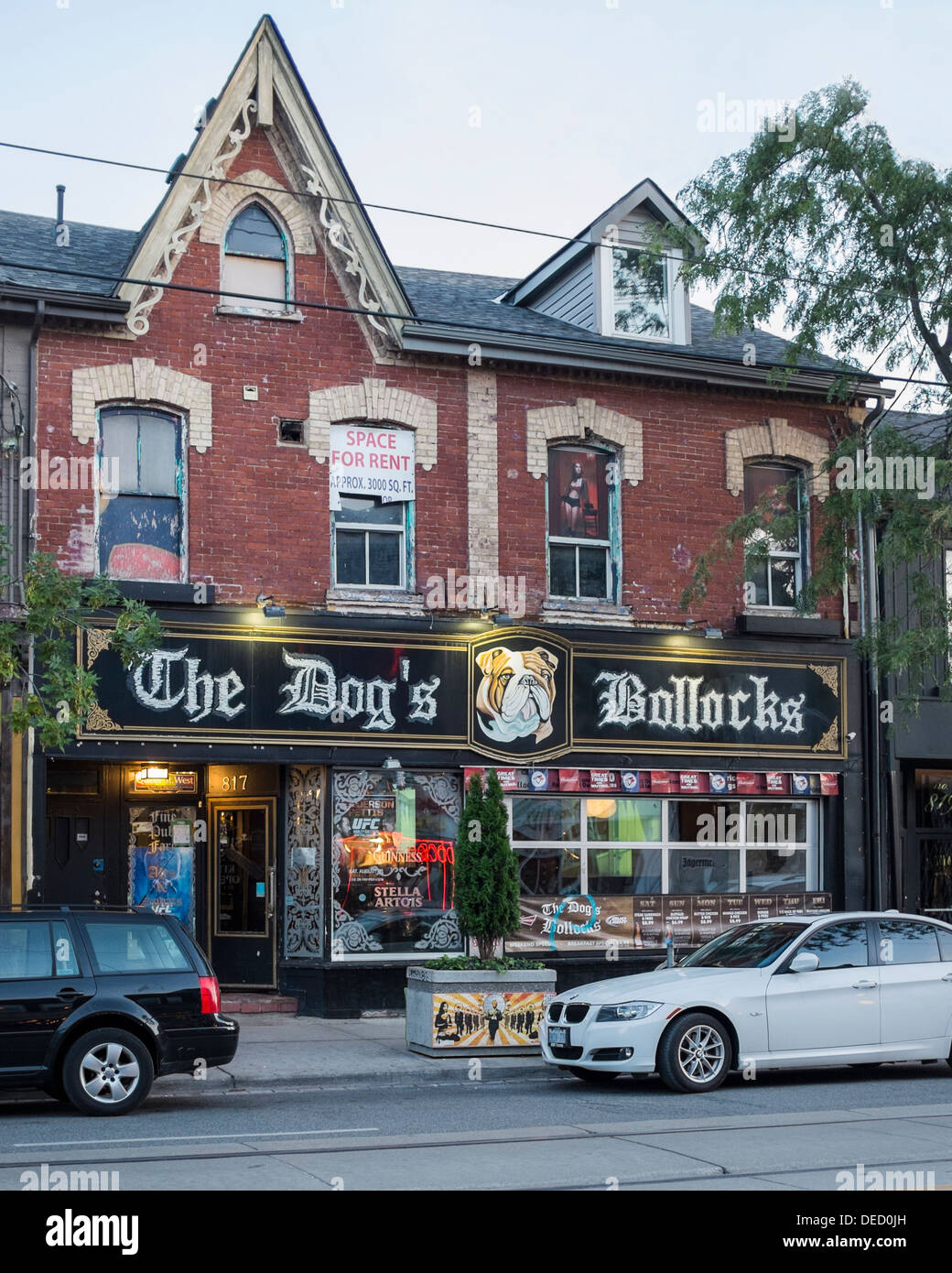 "The Dog's Bollocks" pub in a gabled old building in Queen St. W ...