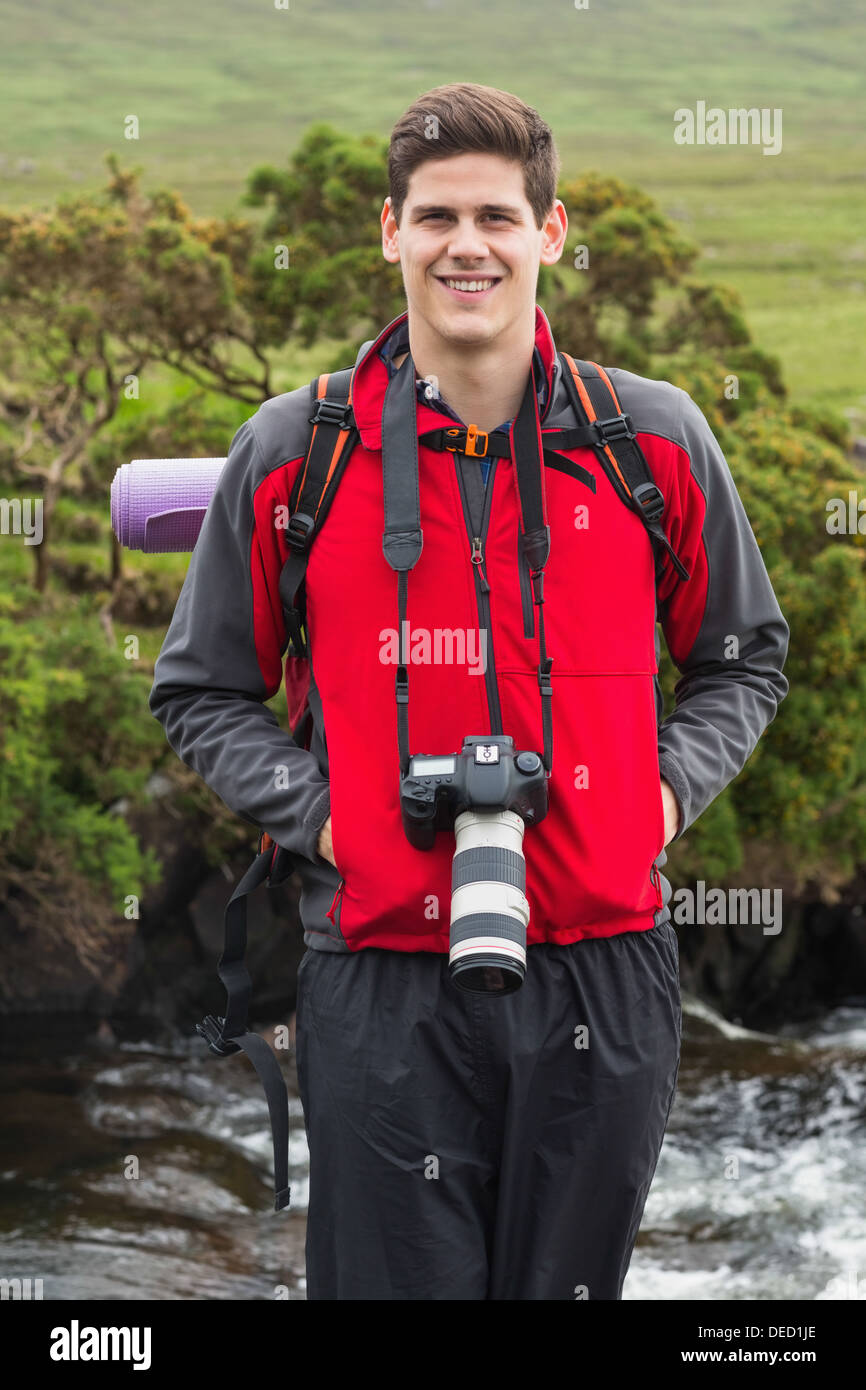 Handsome man camera around neck hi-res stock photography and images - Alamy