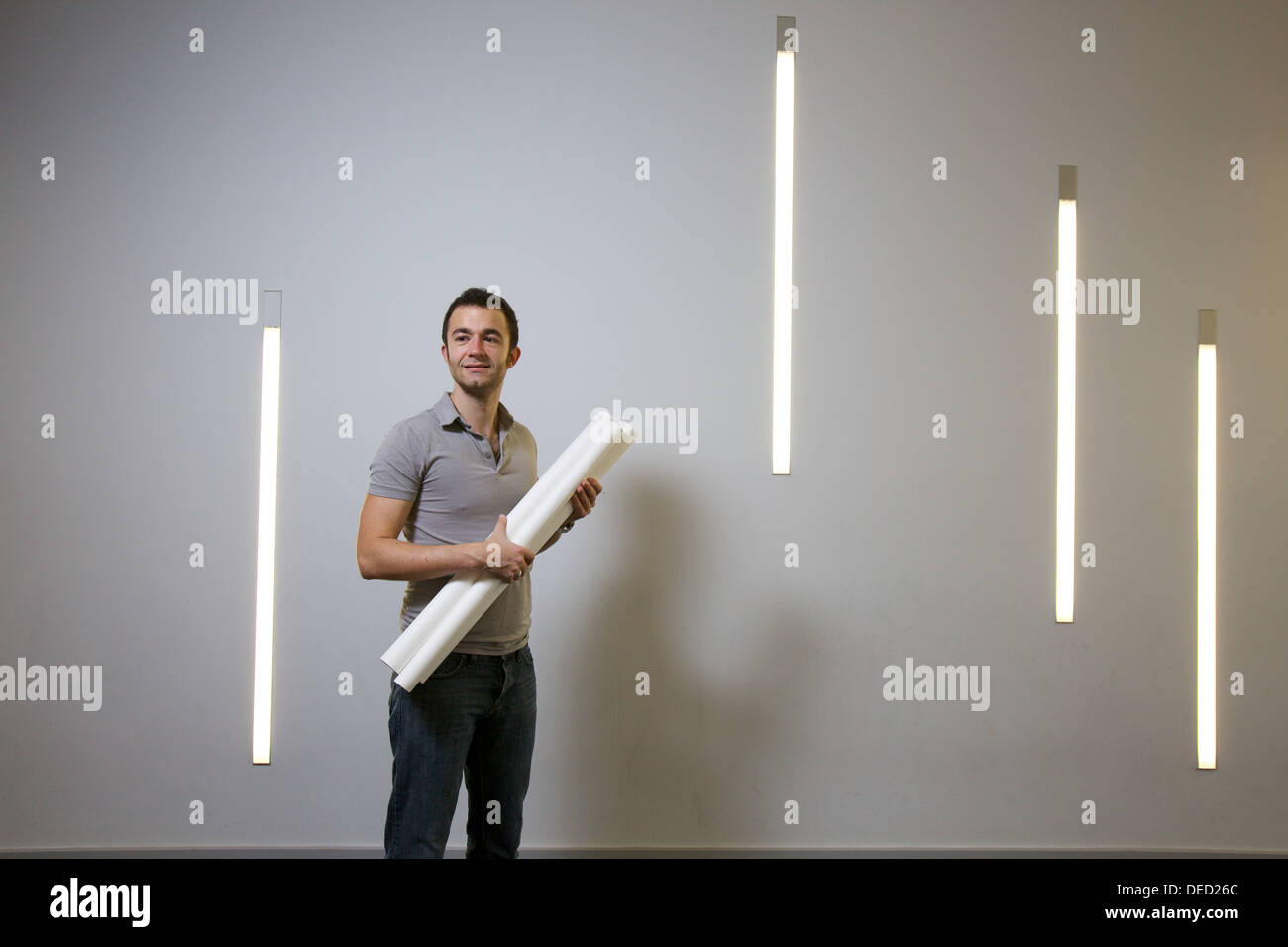 portrait of architecture student with drawings Stock Photo - Alamy