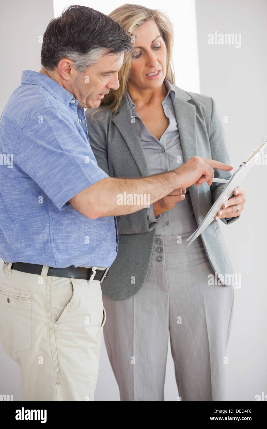 Explaining agent hi-res stock photography and images - Alamy