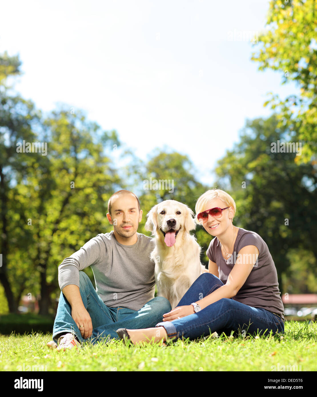 Woman hugging a labrador puppy hi-res stock photography and images - Alamy