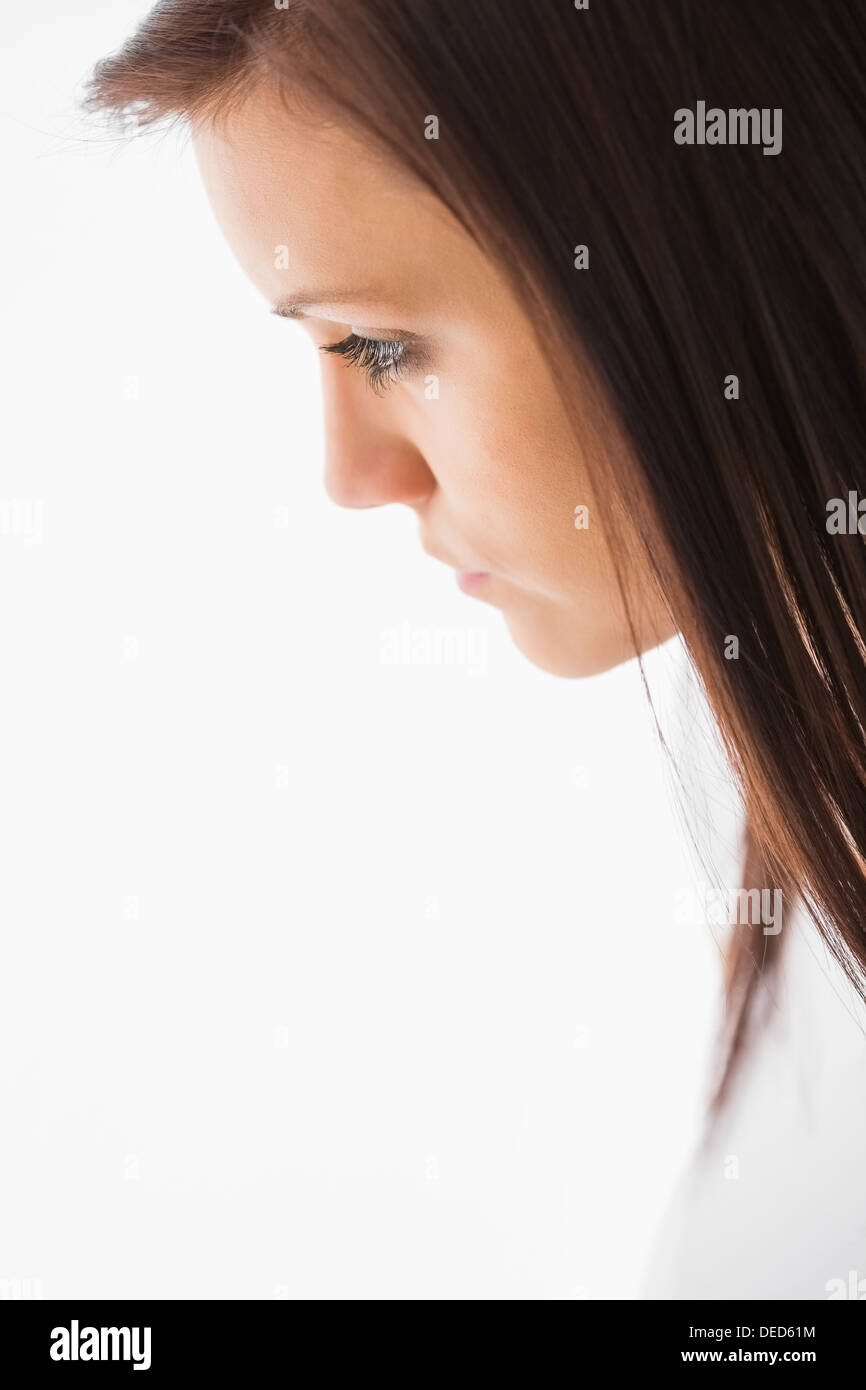 Thoughtful girl looking away Stock Photo - Alamy