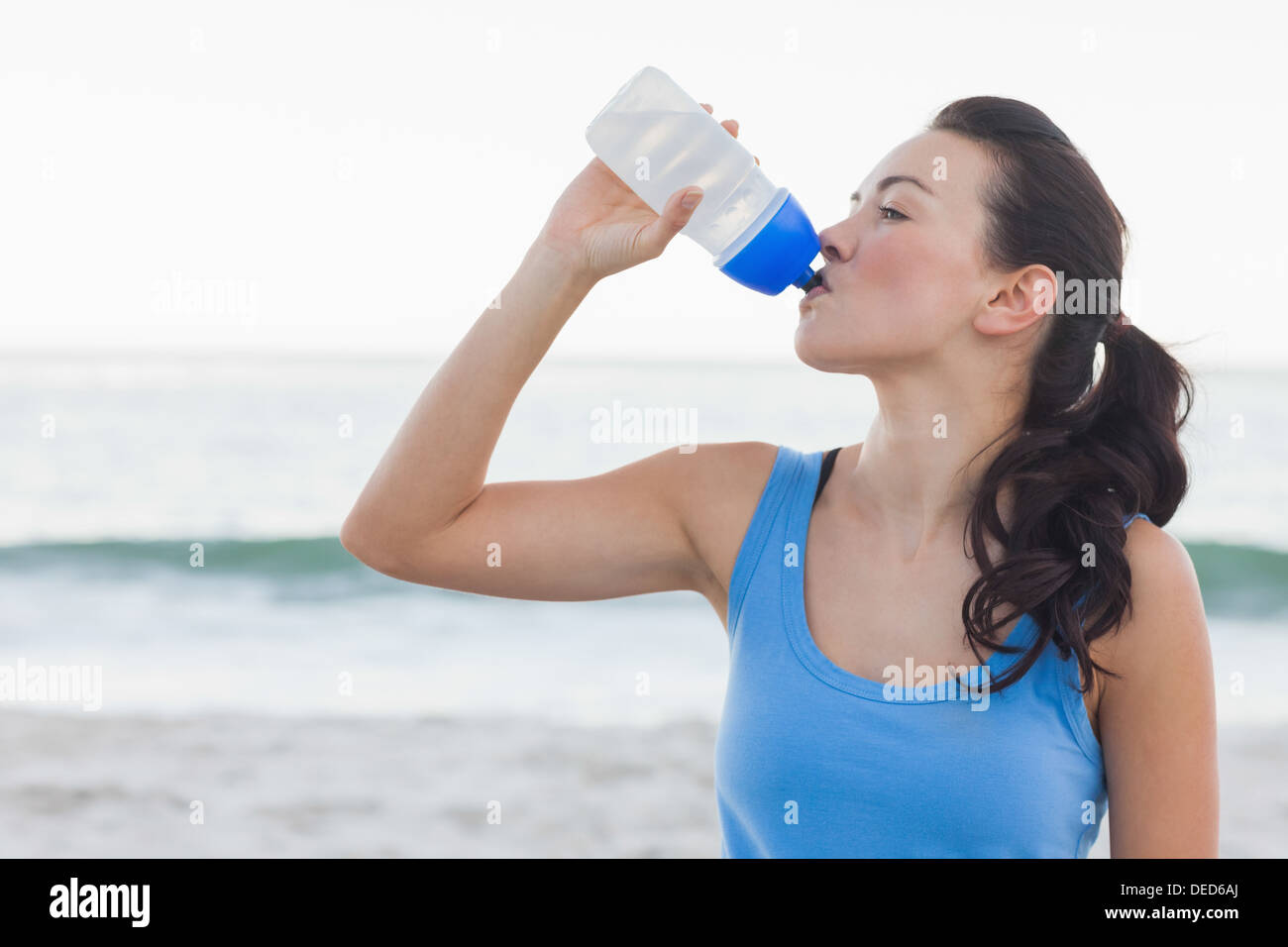 Drinking water after working out hi-res stock photography and images ...