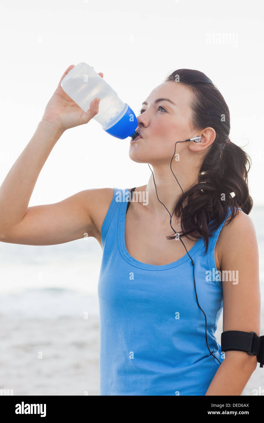 Female runner drinking water hi-res stock photography and images - Alamy