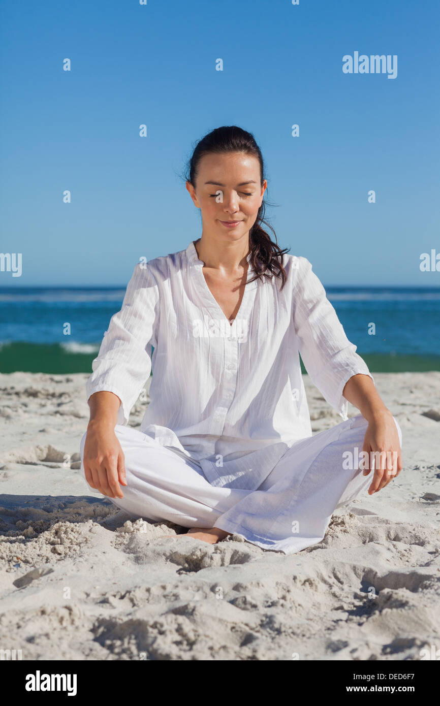 Beautiful female sitting on sand hi-res stock photography and images ...