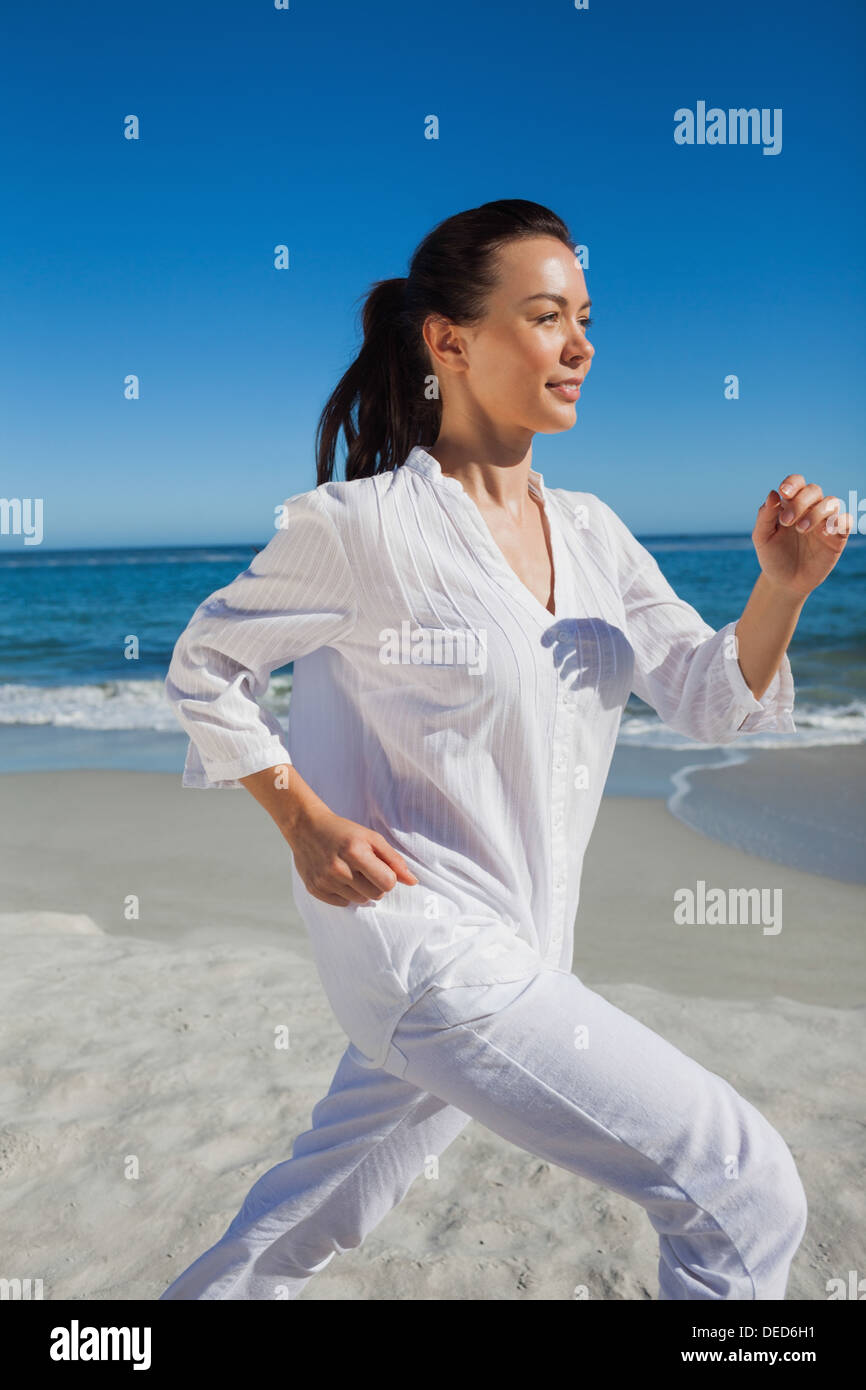 Woman running waves hi-res stock photography and images - Alamy
