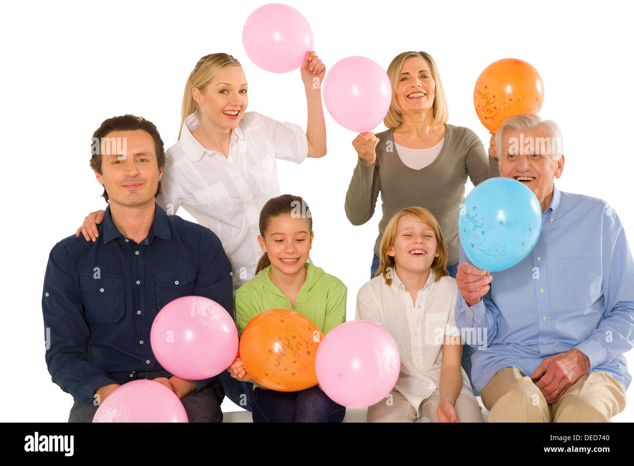 family birthday party with baloons Stock Photo - Alamy