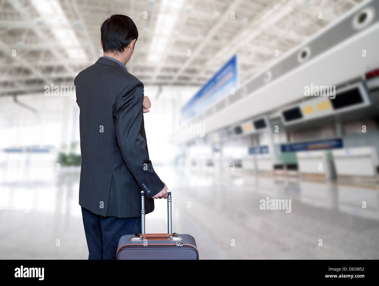 Business man at airport Stock Photo - Alamy
