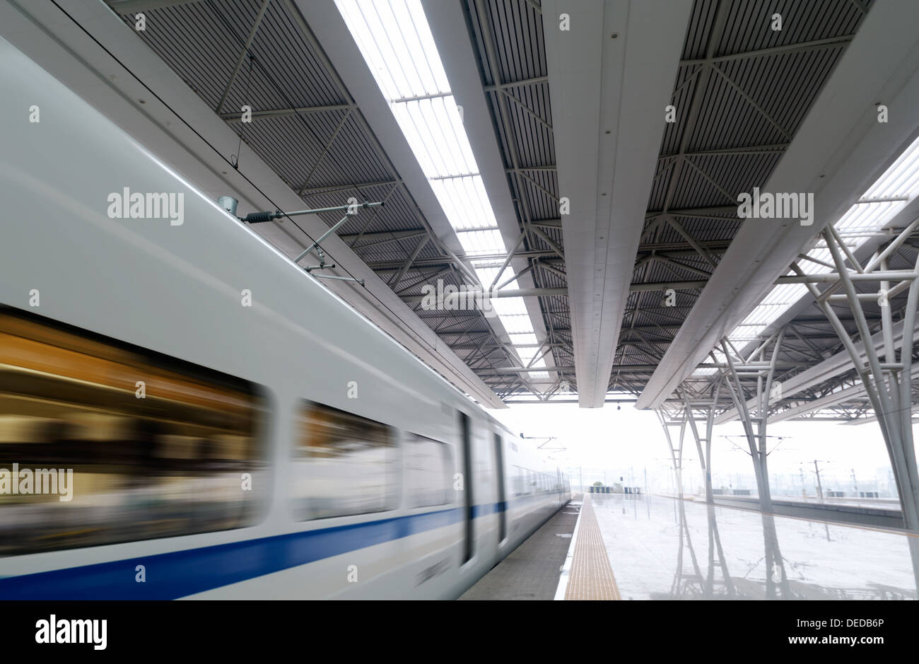 train stop at railway station Stock Photo - Alamy