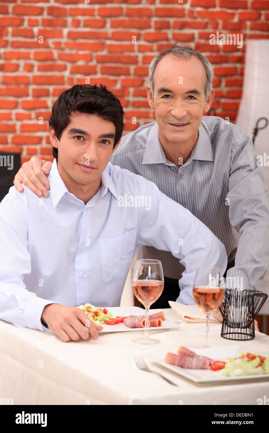 Two men in a restaurant Stock Photo - Alamy