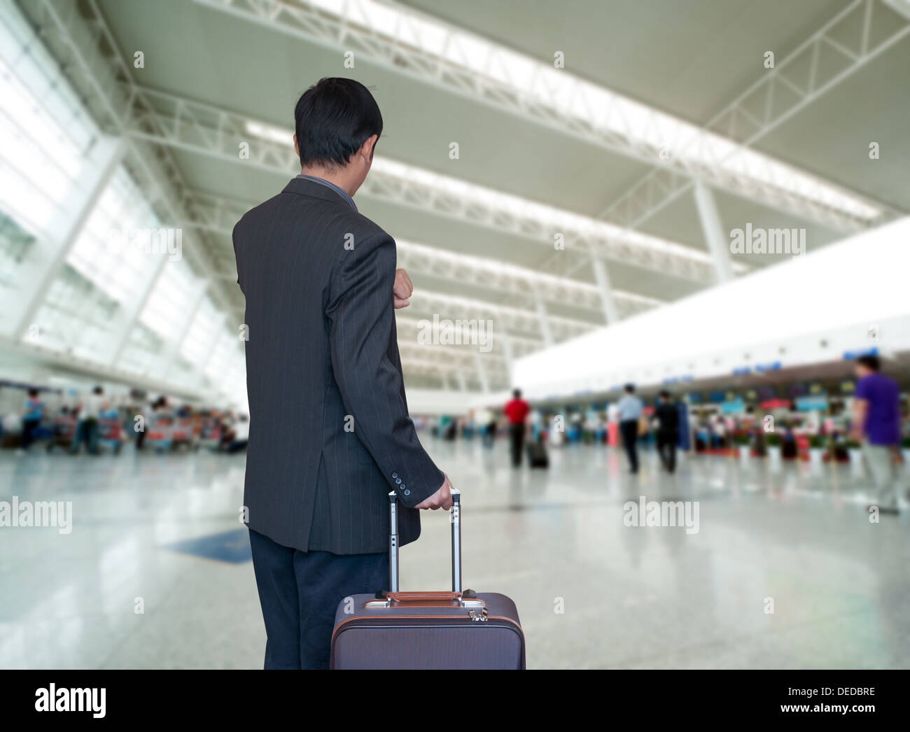 Business man at airport Stock Photo - Alamy