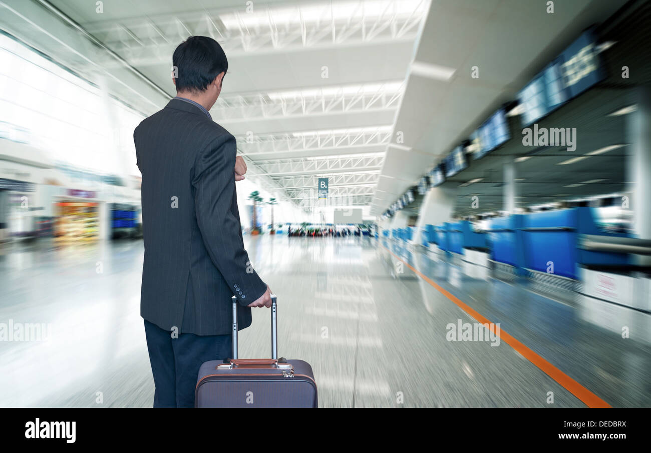 Business man at airport Stock Photo - Alamy