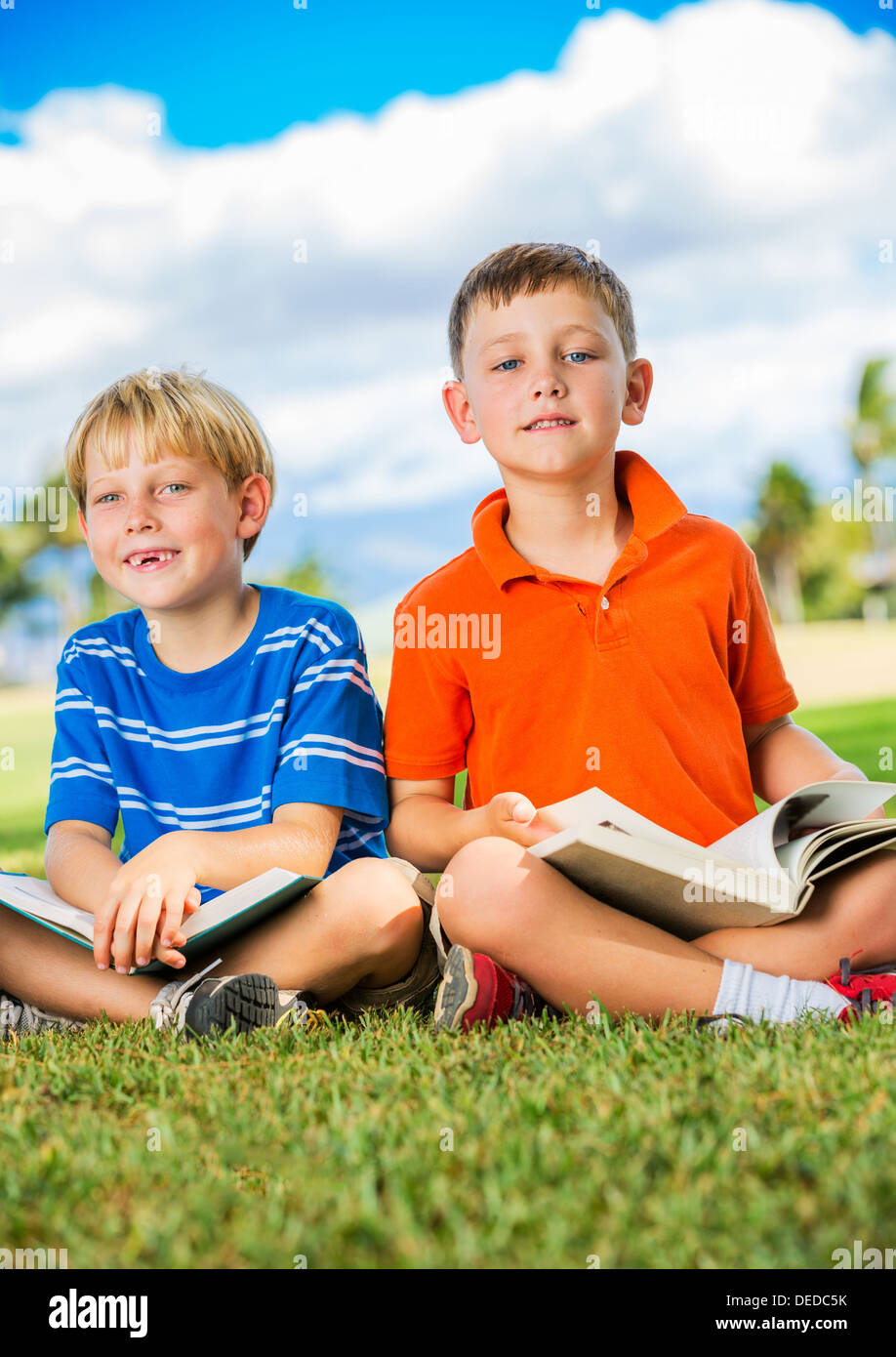 Happy Kids, Young Boys Reading Books Outside Together after School ...