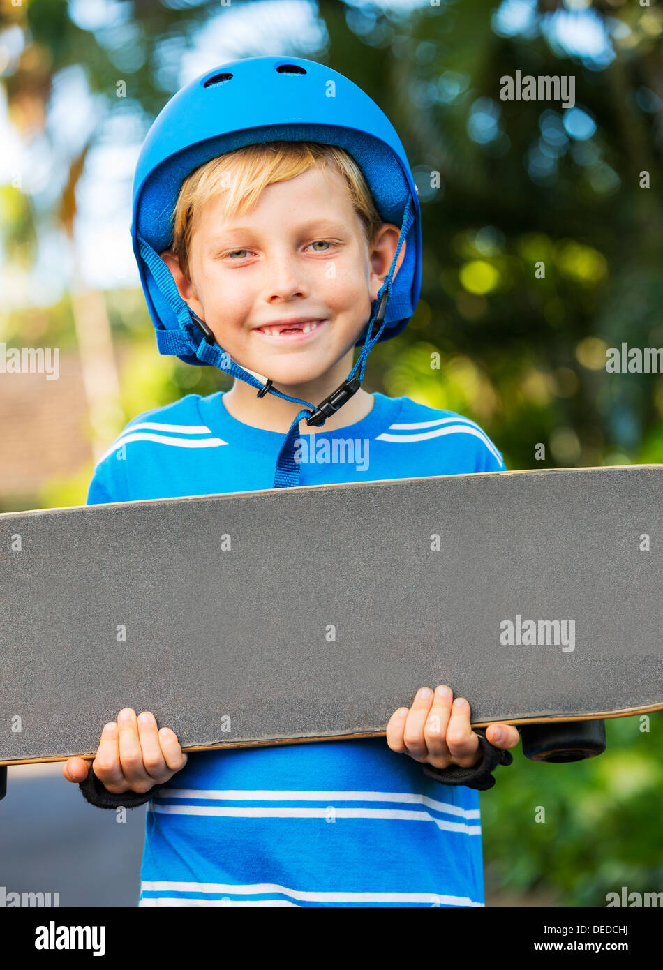 Cute Boy with Skate Board Stock Photo - Alamy