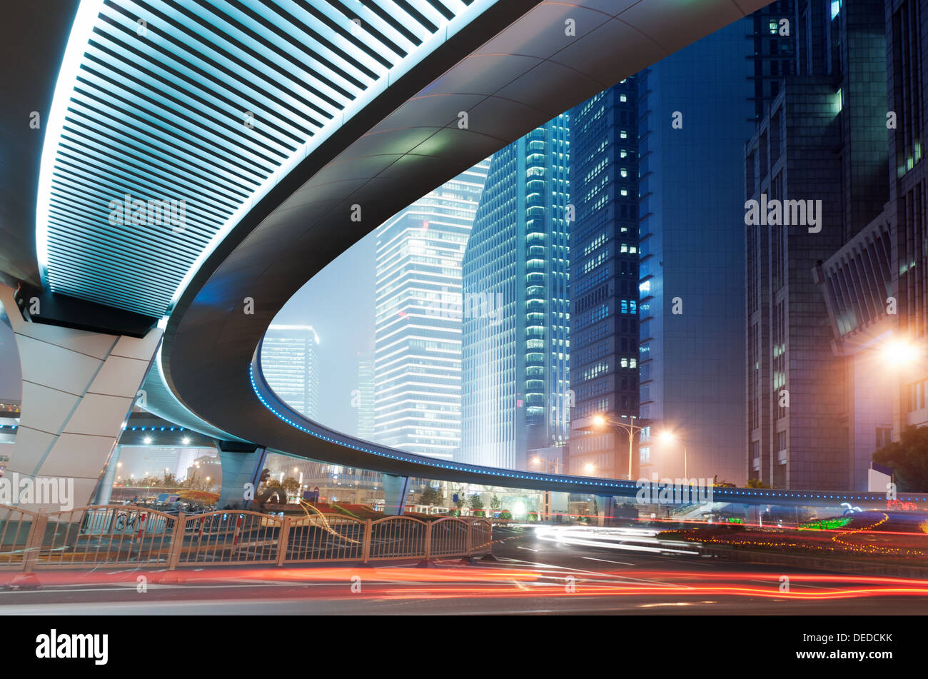 the light trails on the modern building background in shanghai china ...