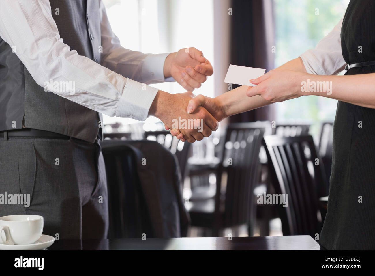 Changing hands hi-res stock photography and images - Alamy
