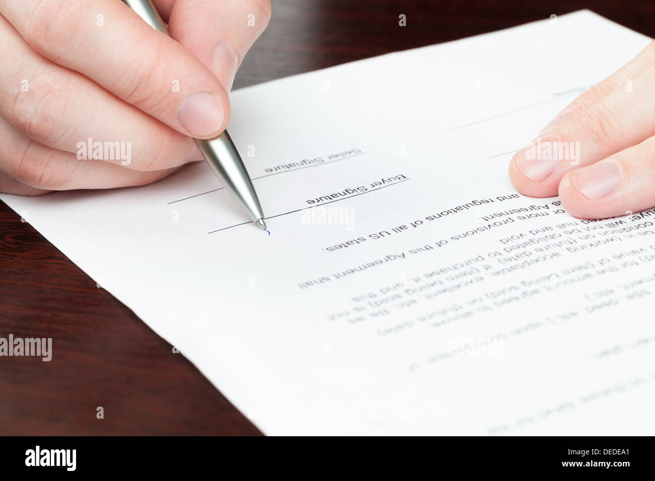 Financial world with business people - signing document Stock Photo - Alamy