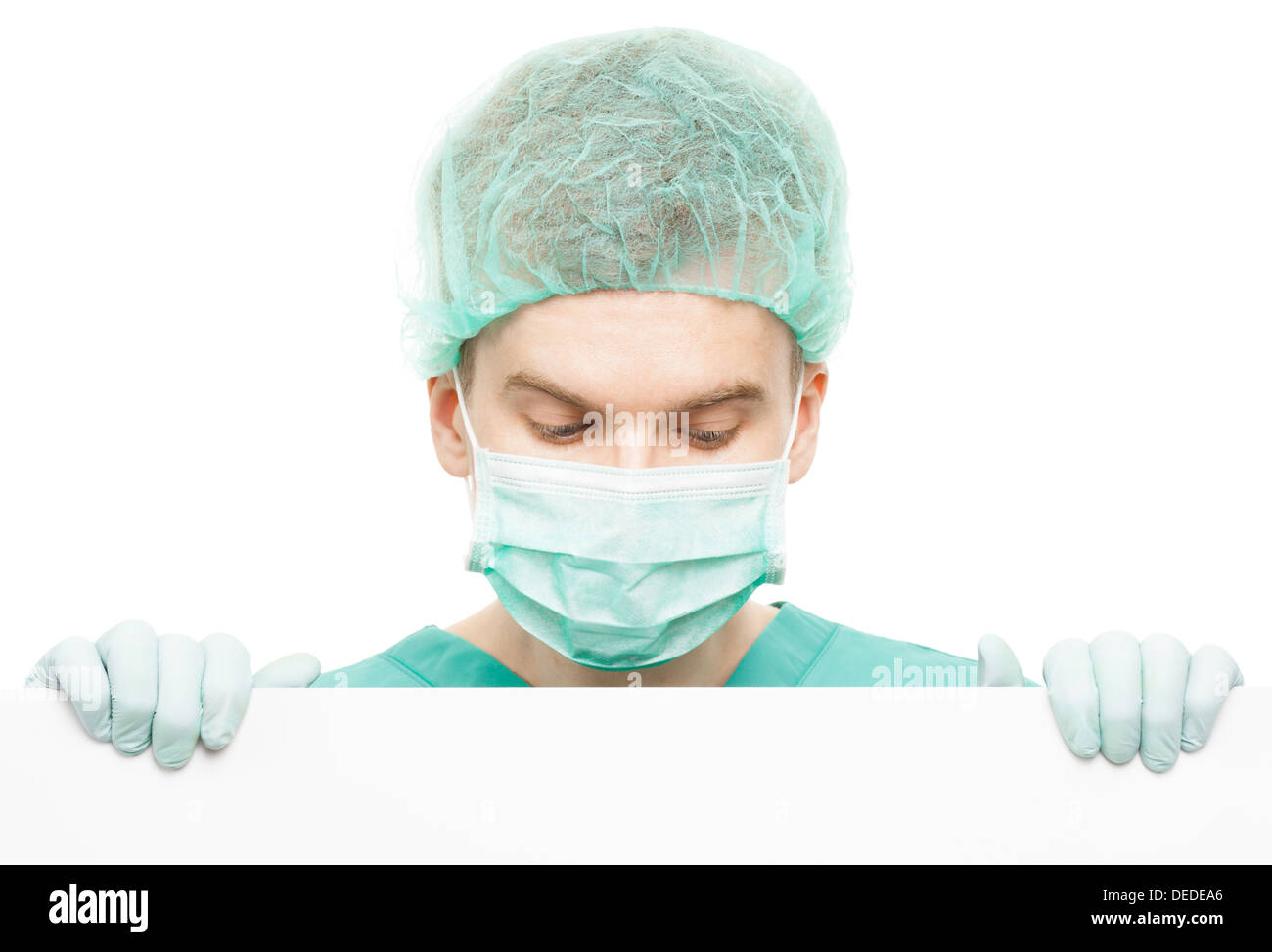 Surgeon looking down from the top of the board below him isolated on ...