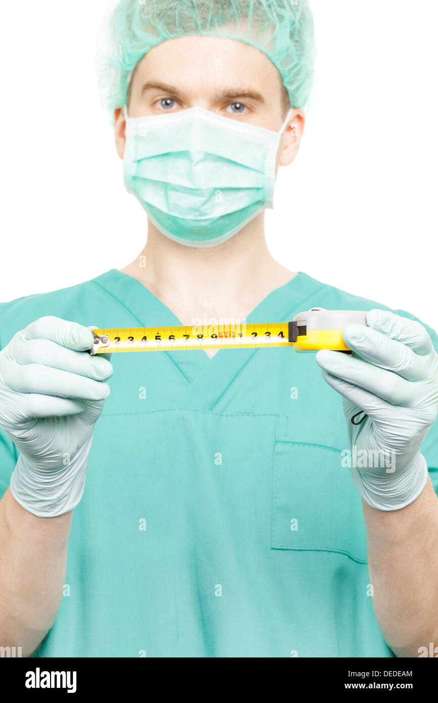 Surgeon with tape measure isolated on white background Stock Photo - Alamy