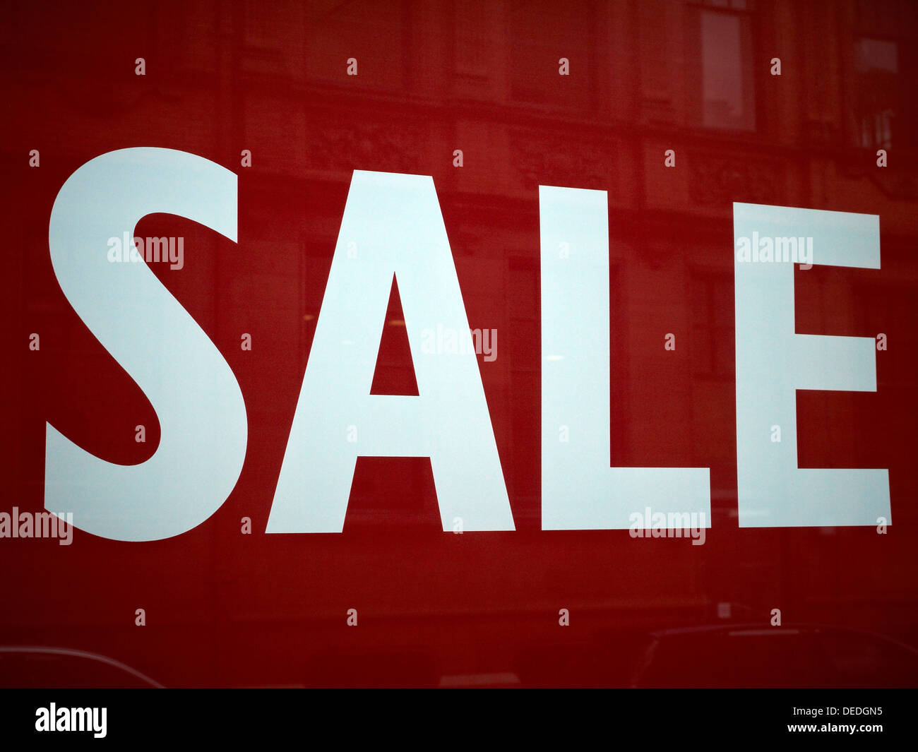 Sale sign in shop window UK Stock Photo - Alamy