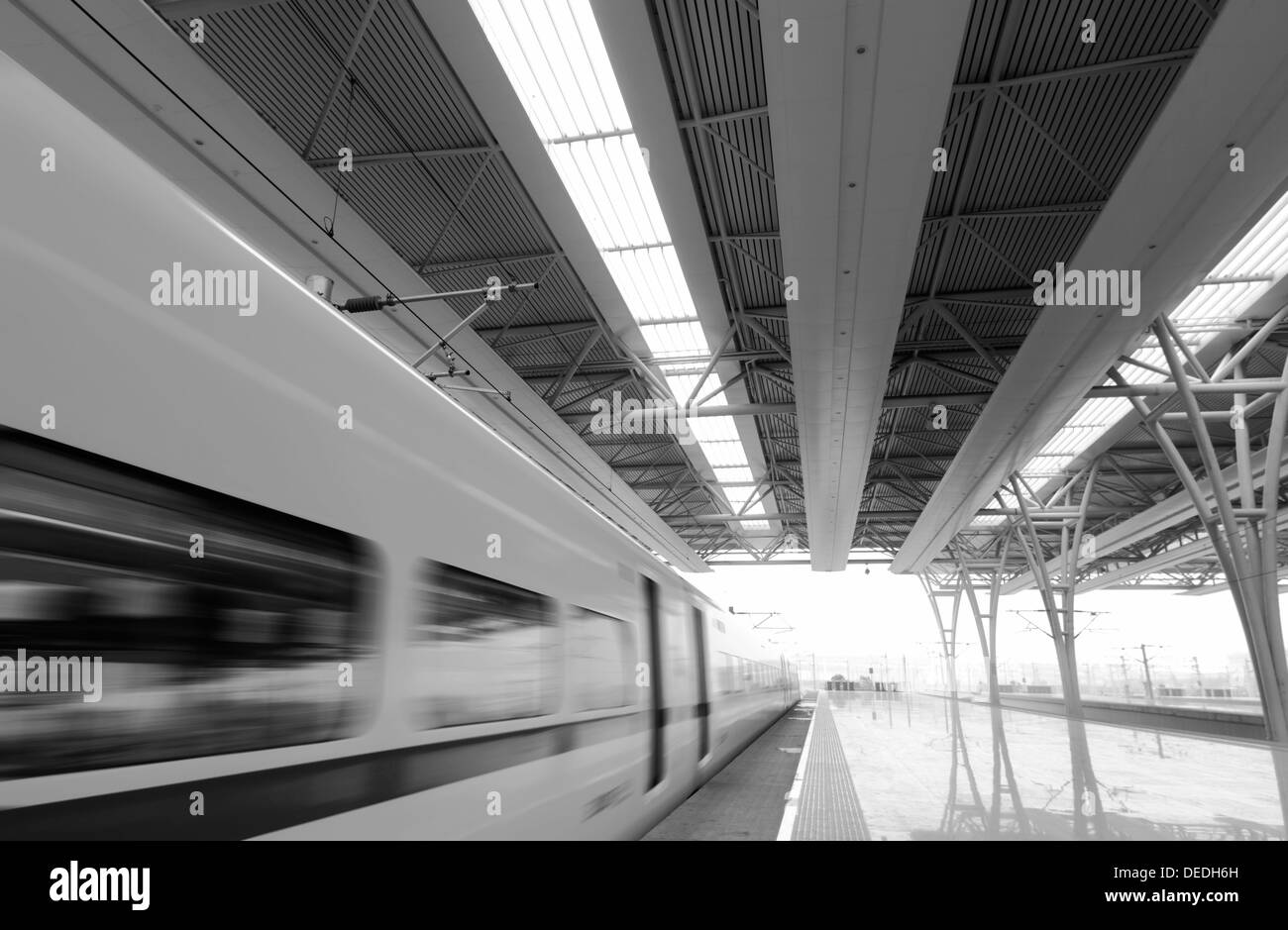 train stop at railway station Stock Photo - Alamy