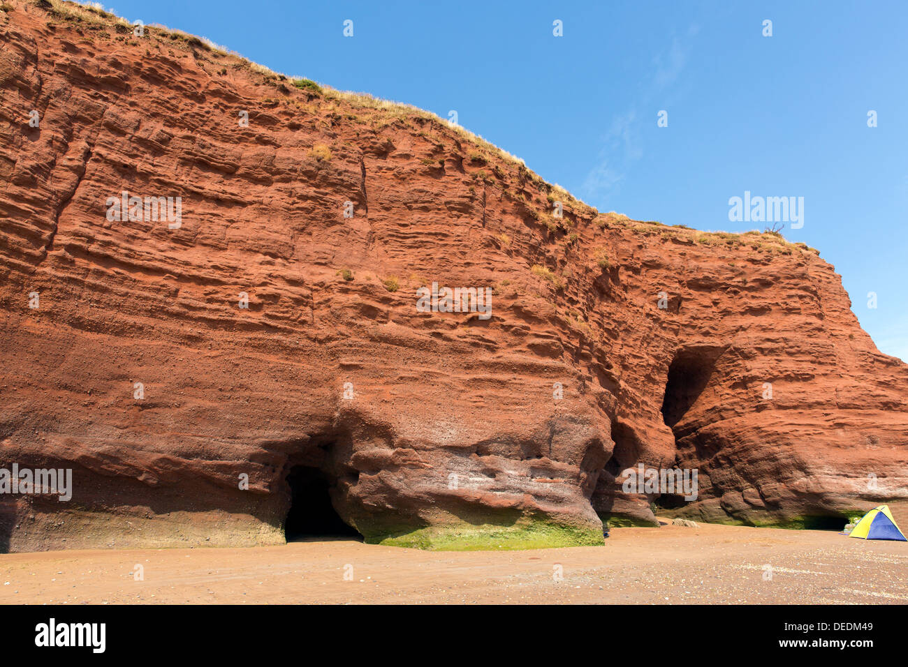 Red rock beach near Dawlish Warren Devon England UK Stock Photo - Alamy