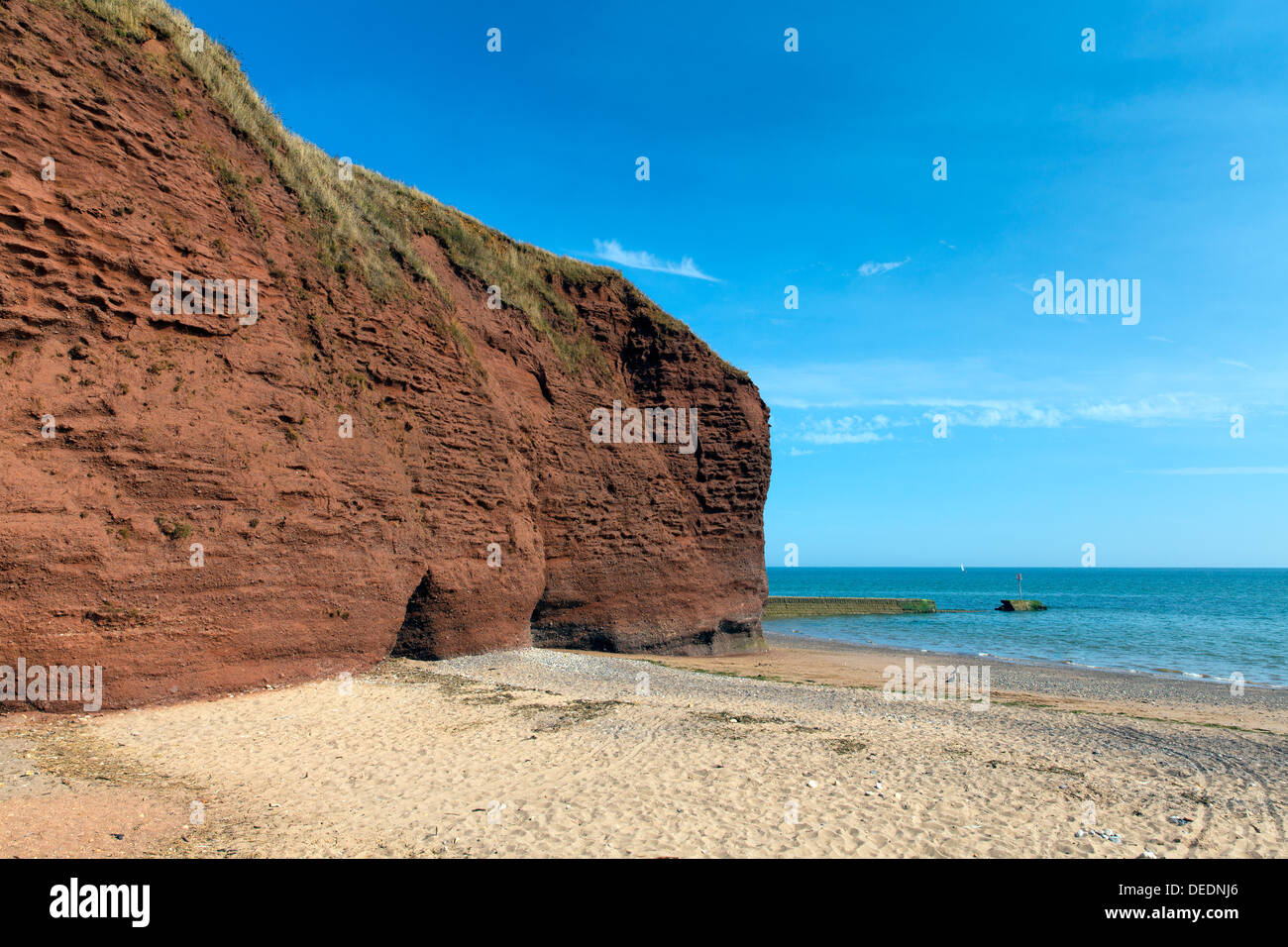 Red rock beach near Dawlish Warren Devon England UK Stock Photo - Alamy
