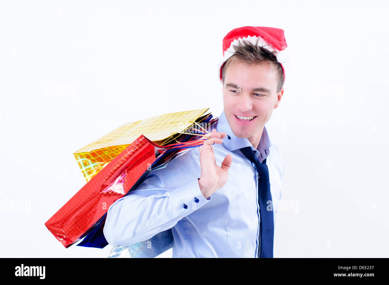 A handsome man coming happy from shopping Stock Photo - Alamy