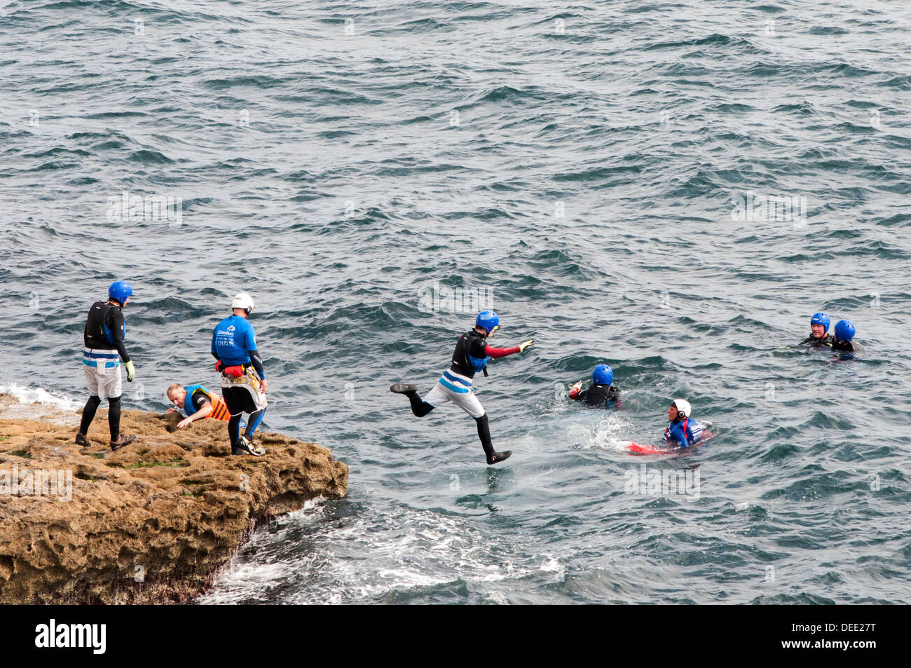 jumping off rocks into the sea, Coasteering Stock Photo - Alamy