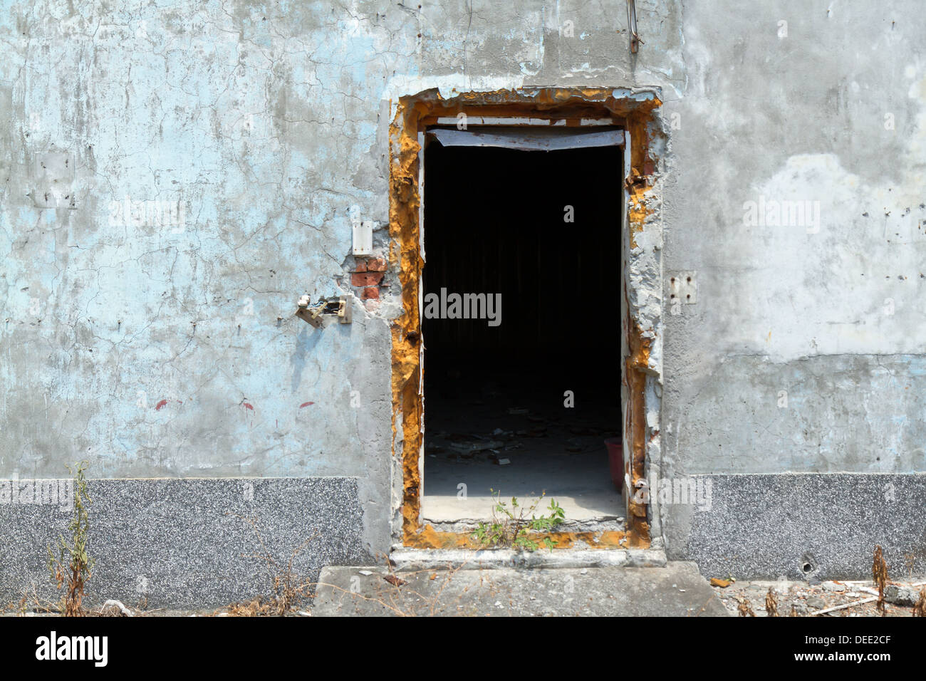 Urban decay examples of abandoned doorways Stock Photo - Alamy