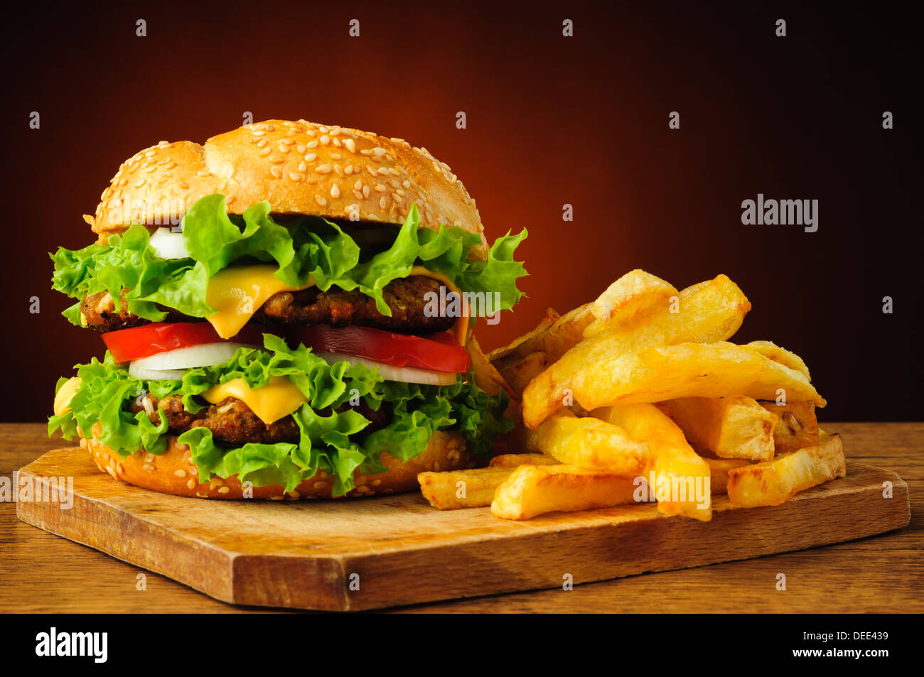 still life with traditional hamburger and french fries Stock Photo - Alamy