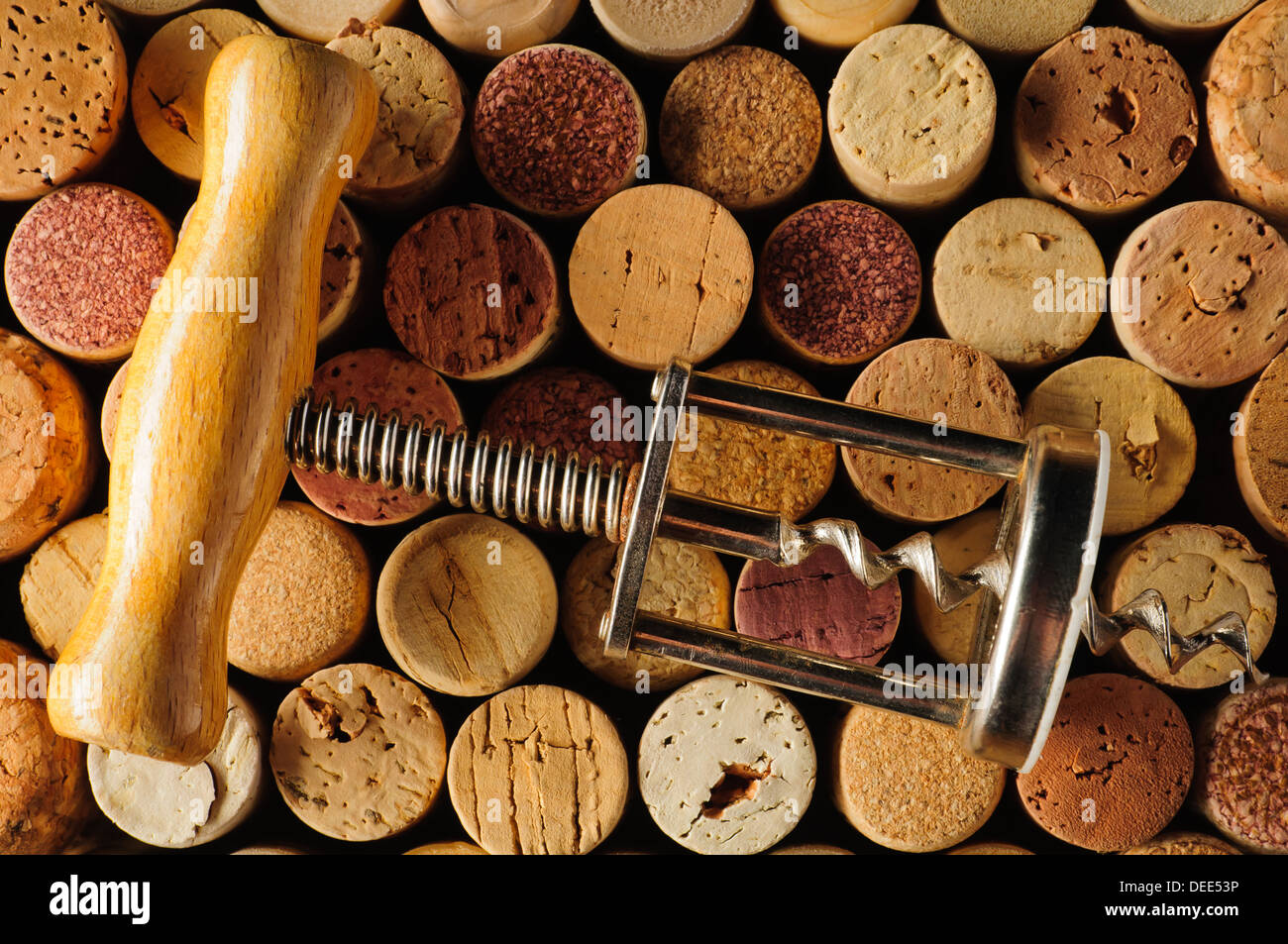 background with corkscrew and different wine corks Stock Photo - Alamy