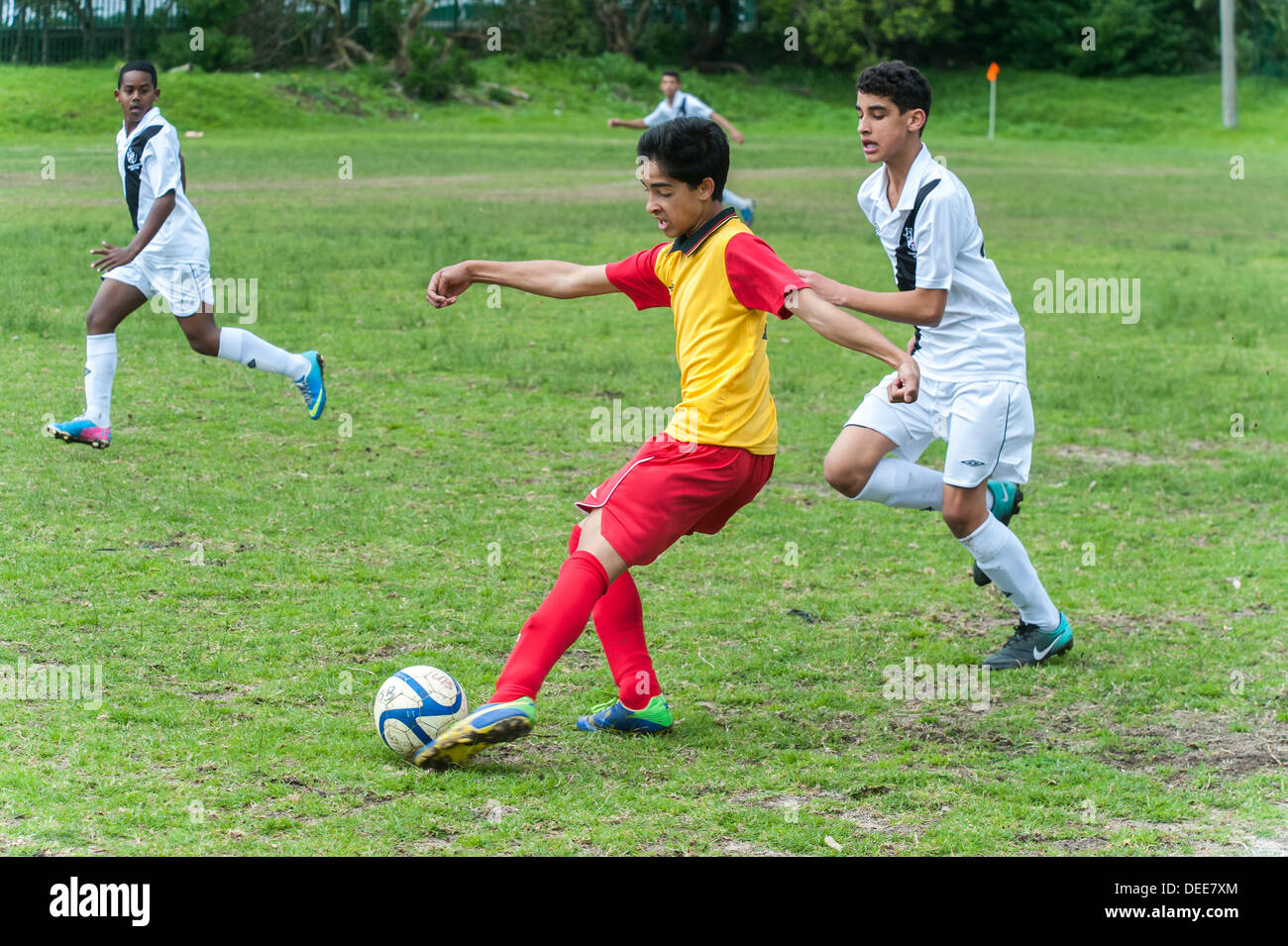 Junior football player passing the ball , Cape Town, South Africa Stock ...