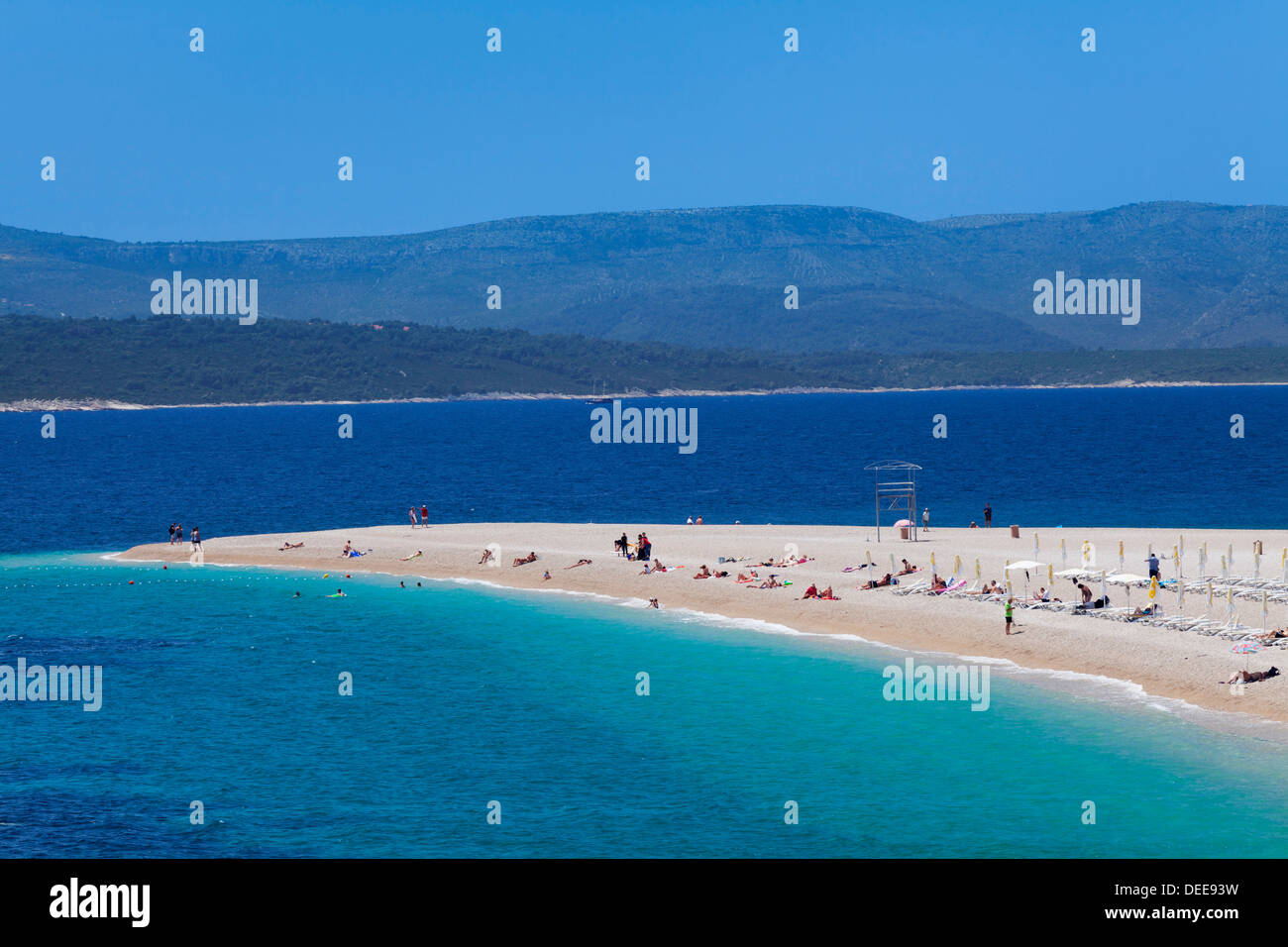 Beach, Zlatni Rat (Golden Horn) and the island of Hvar in the ...