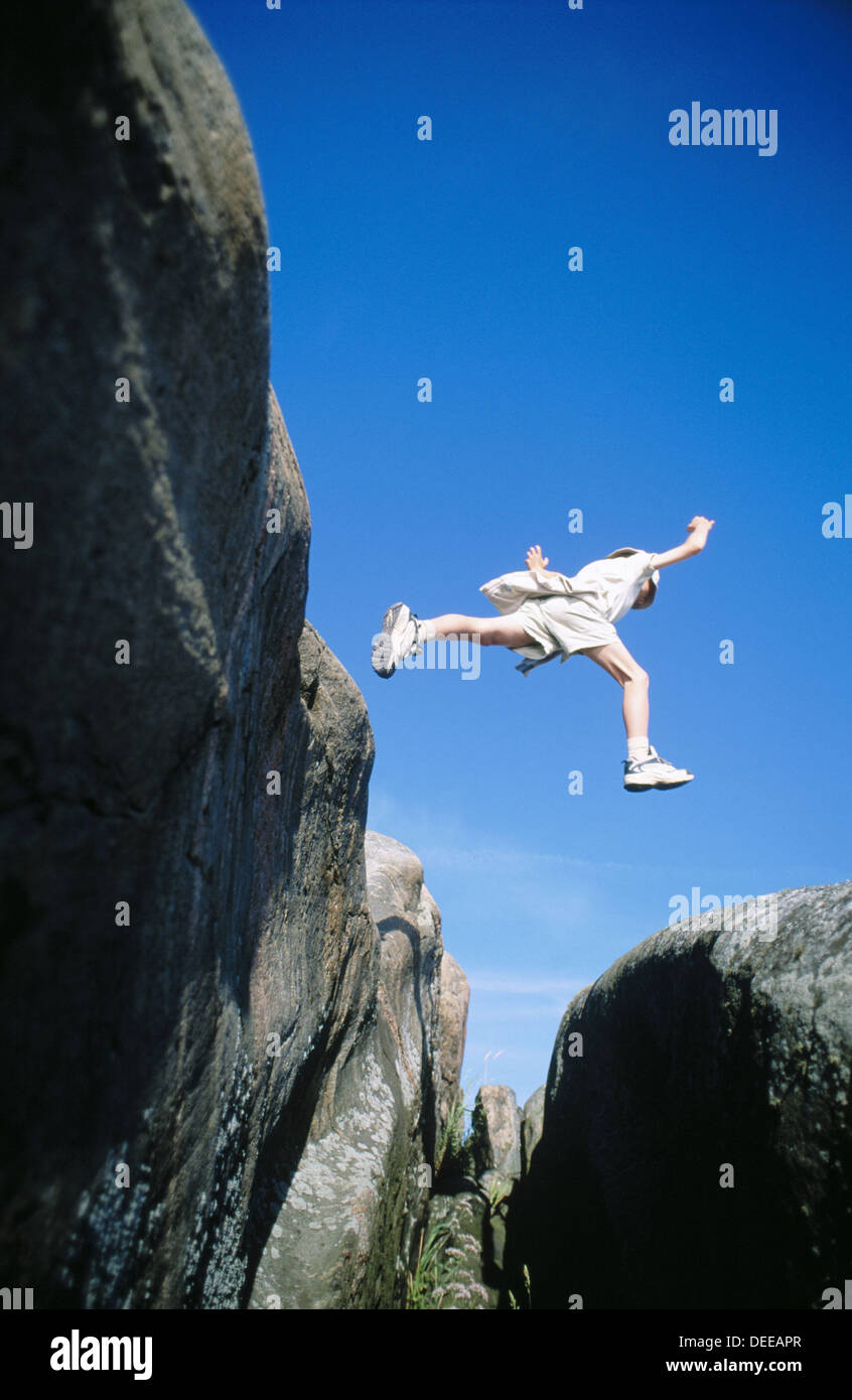 Teen jumping cliff hi-res stock photography and images - Alamy