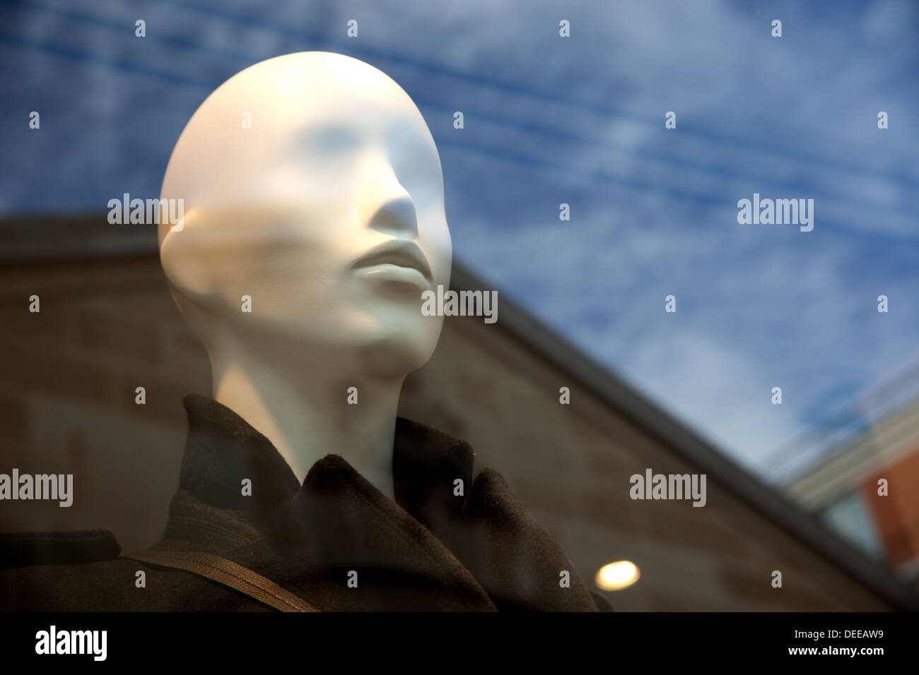 Mannequin behind a shop window Stock Photo - Alamy