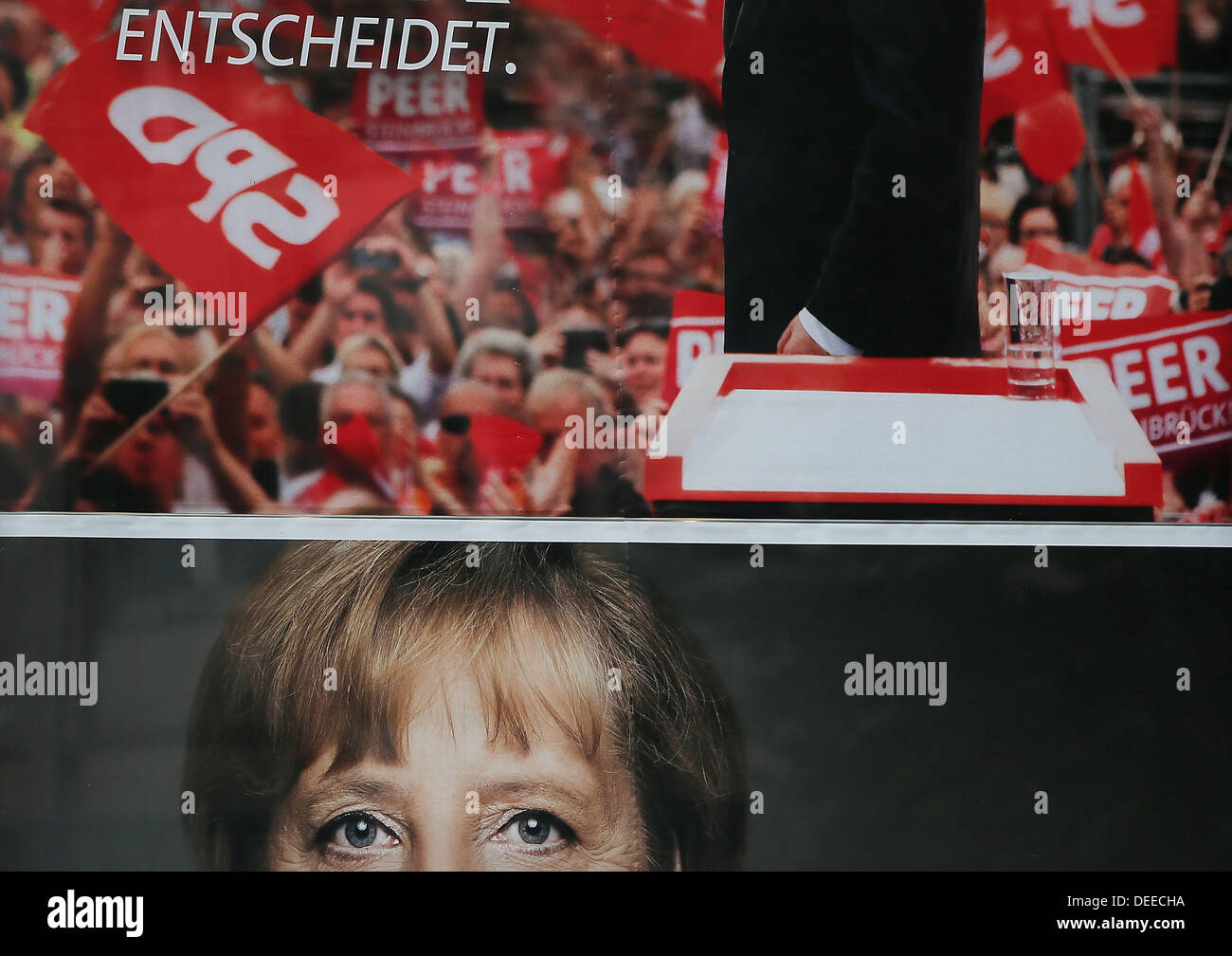 On a moving advertizing board, the poster with the face of Chancellor ...