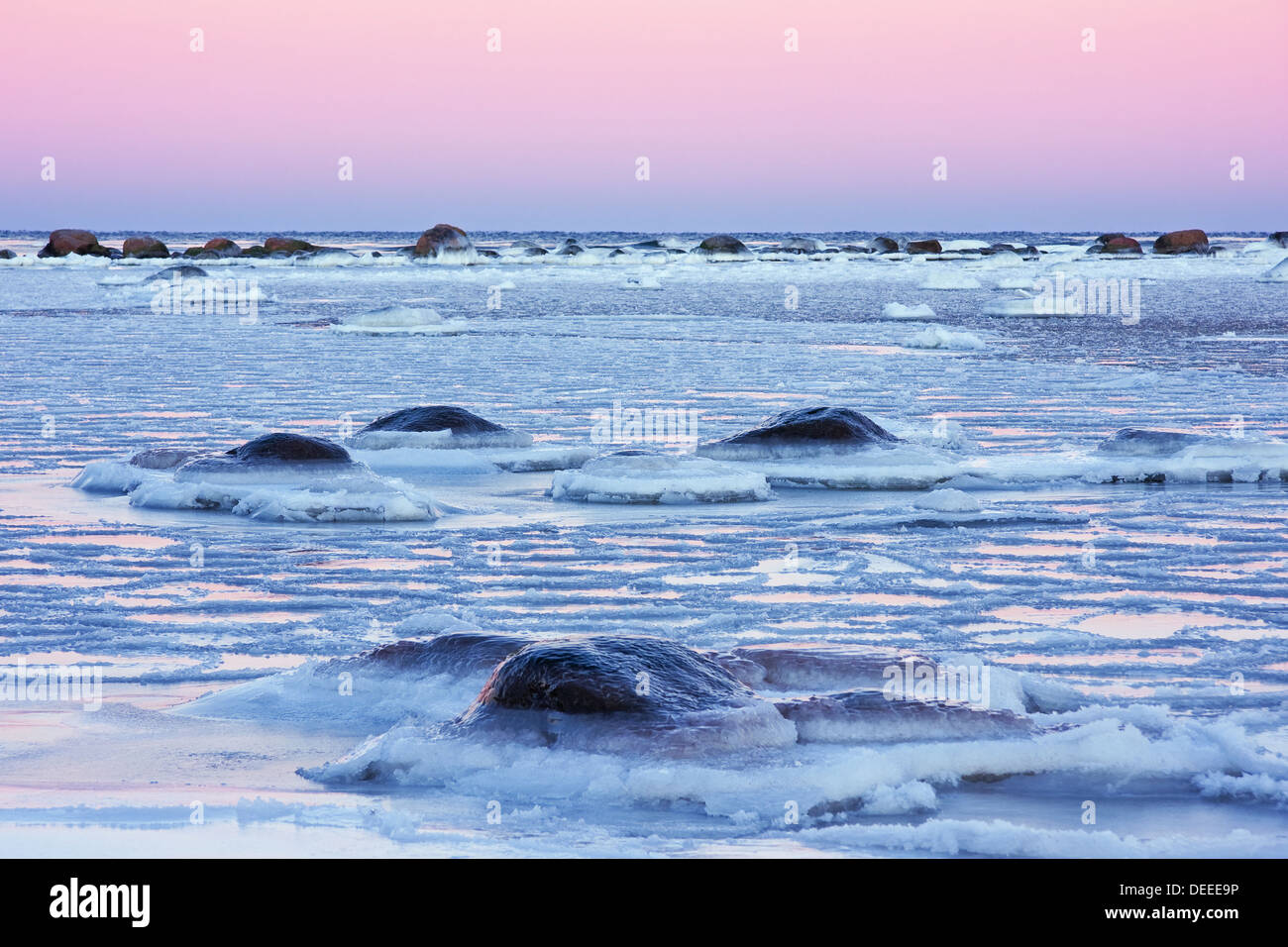 Frosty and icy sea with rocks Stock Photo - Alamy