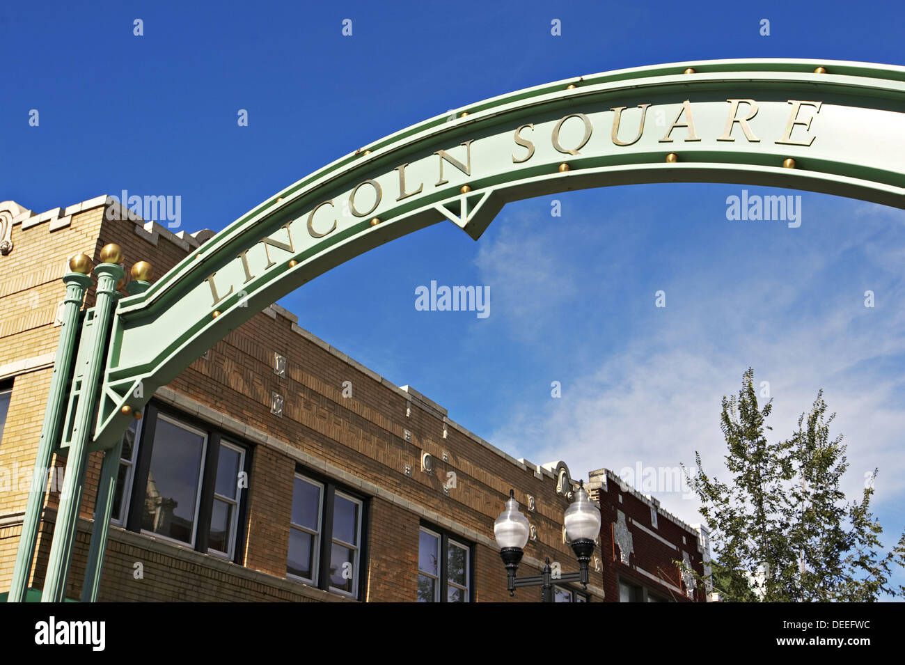 Lincoln Square sign arch over street in shopping district. Chicago ... Lincoln Square sign arch over street in shopping district. Chicago ...
