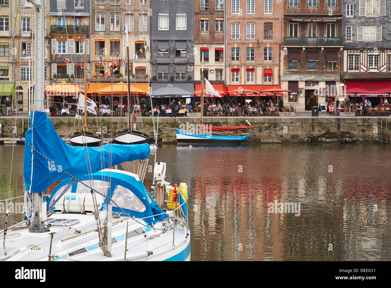 Honfleur harbour with quayside restaurants and yachts Stock Photo - Alamy