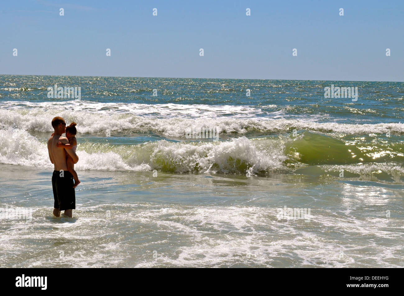 Father and Daughter first time in the waves Stock Photo - Alamy