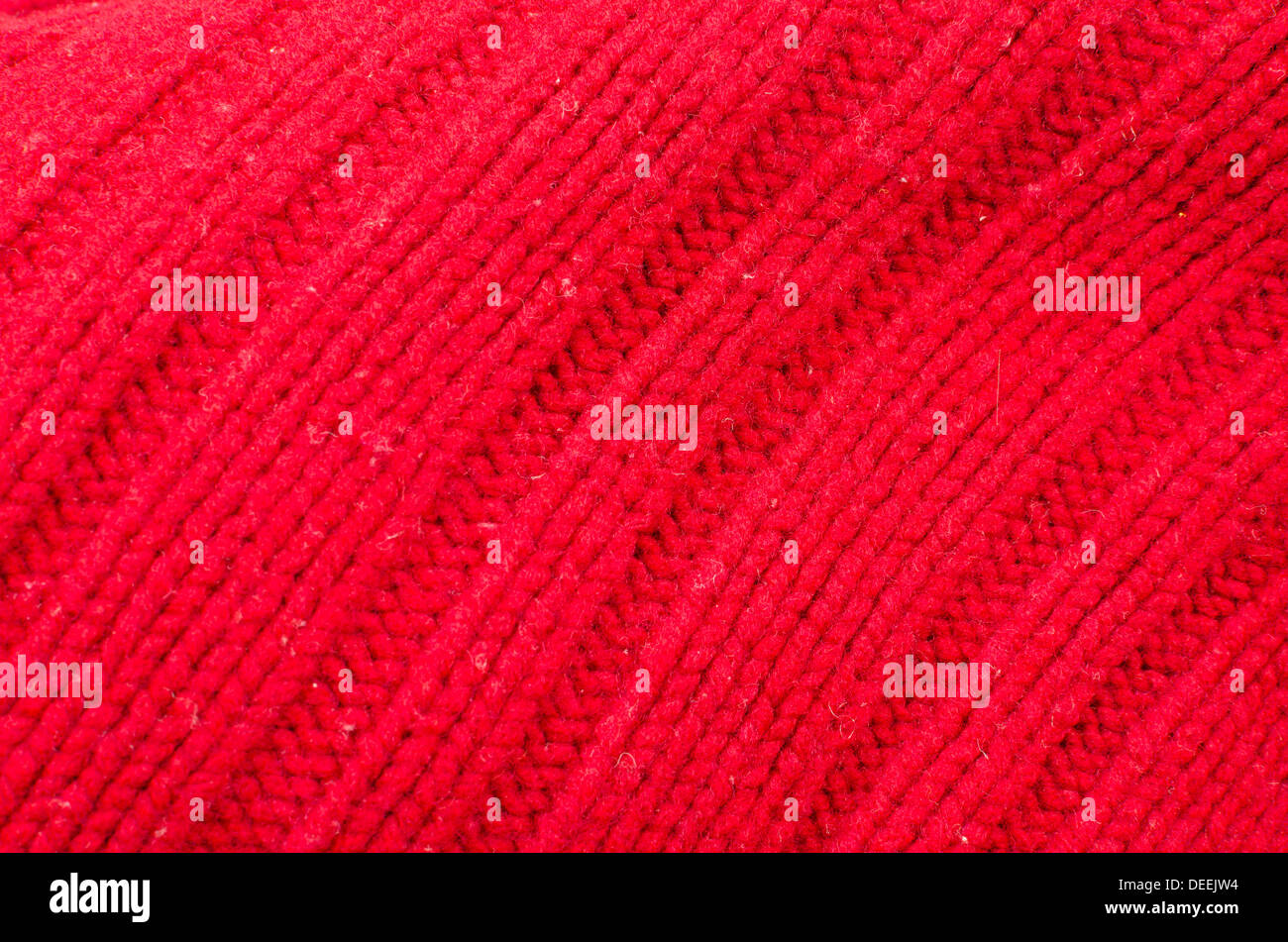Full frame take of a red woolen pattern Stock Photo - Alamy
